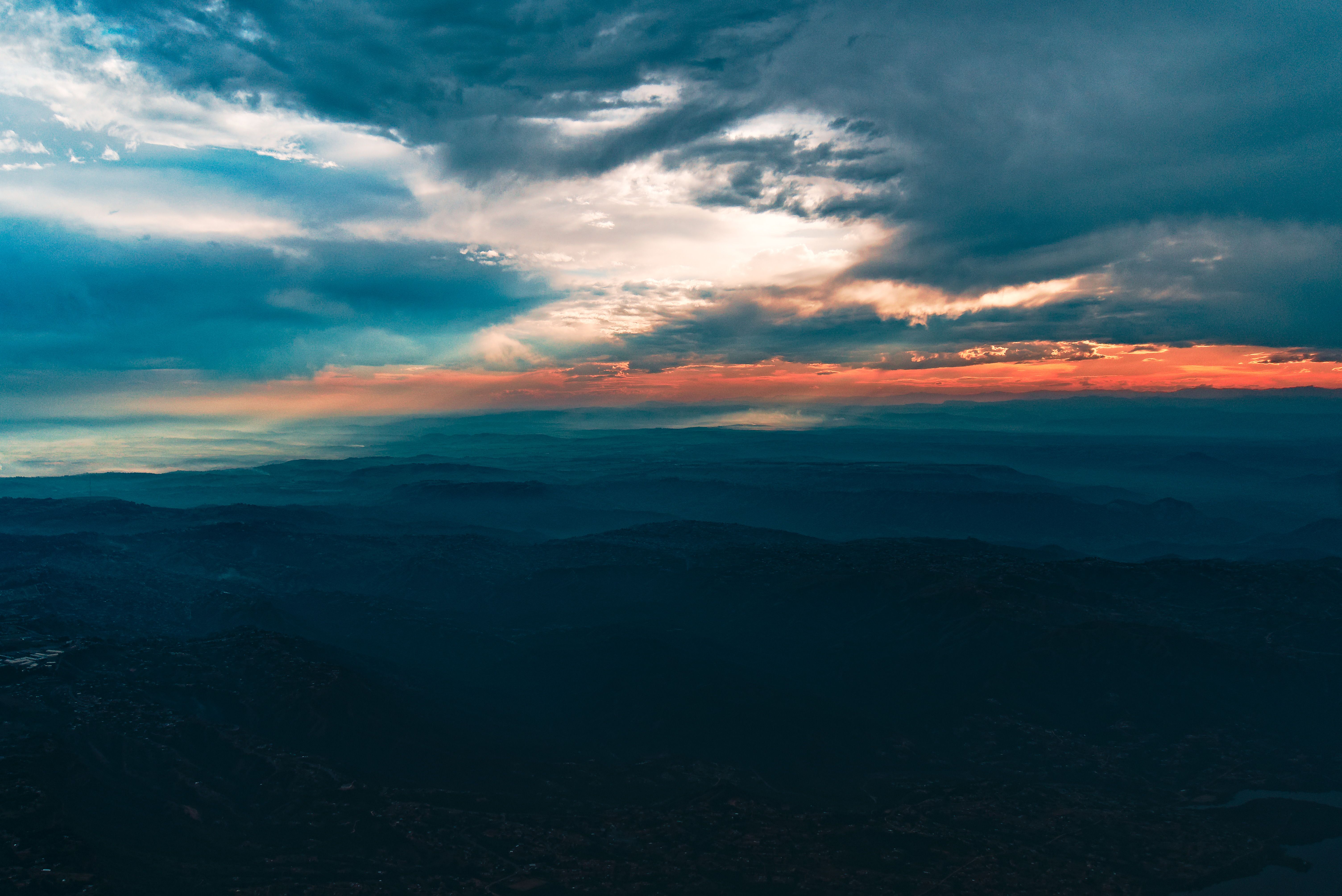 Overcast over Hills at Sunset · Free Stock Photo