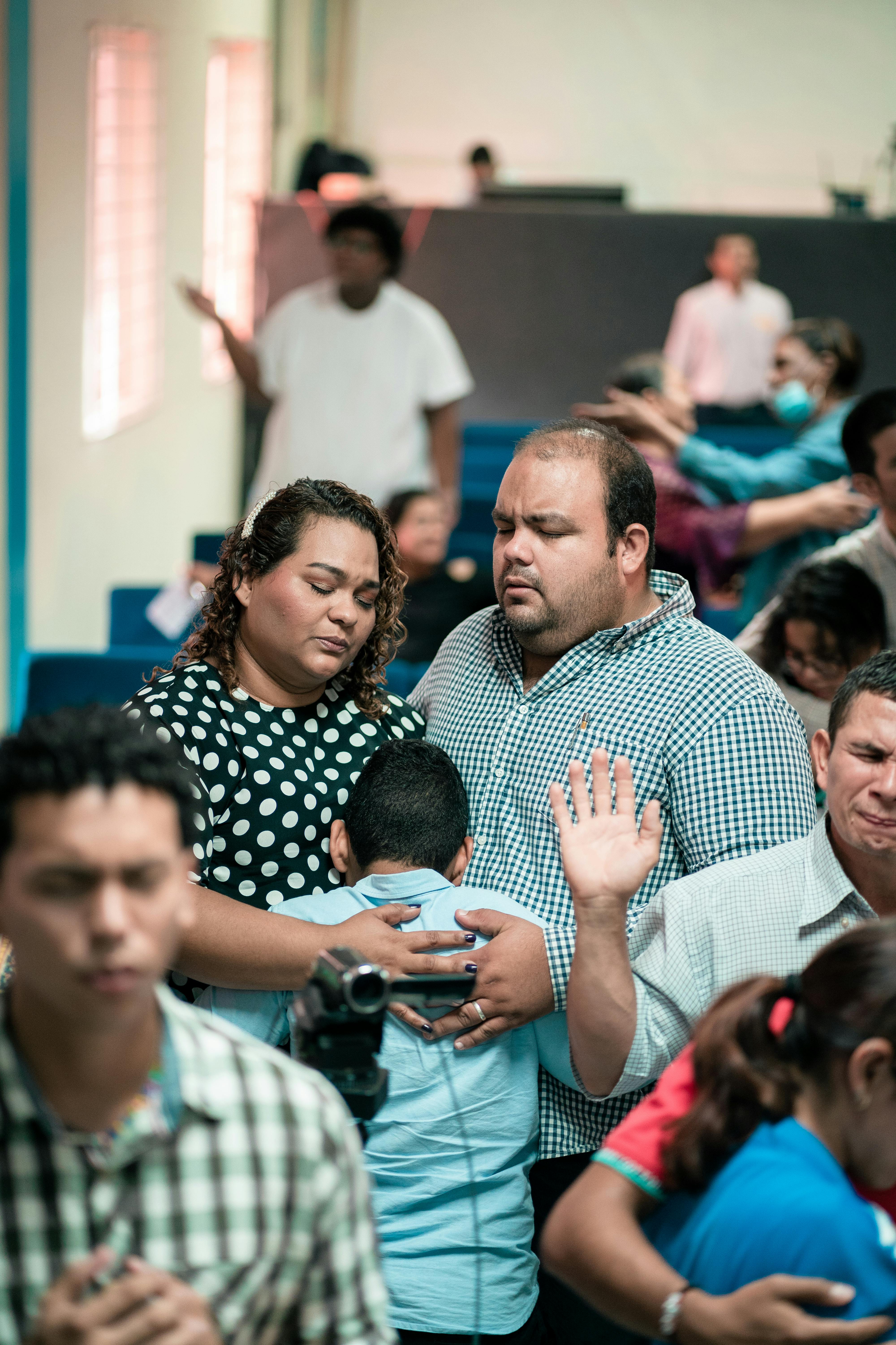 Father and Son Praying Together · Free Stock Photo