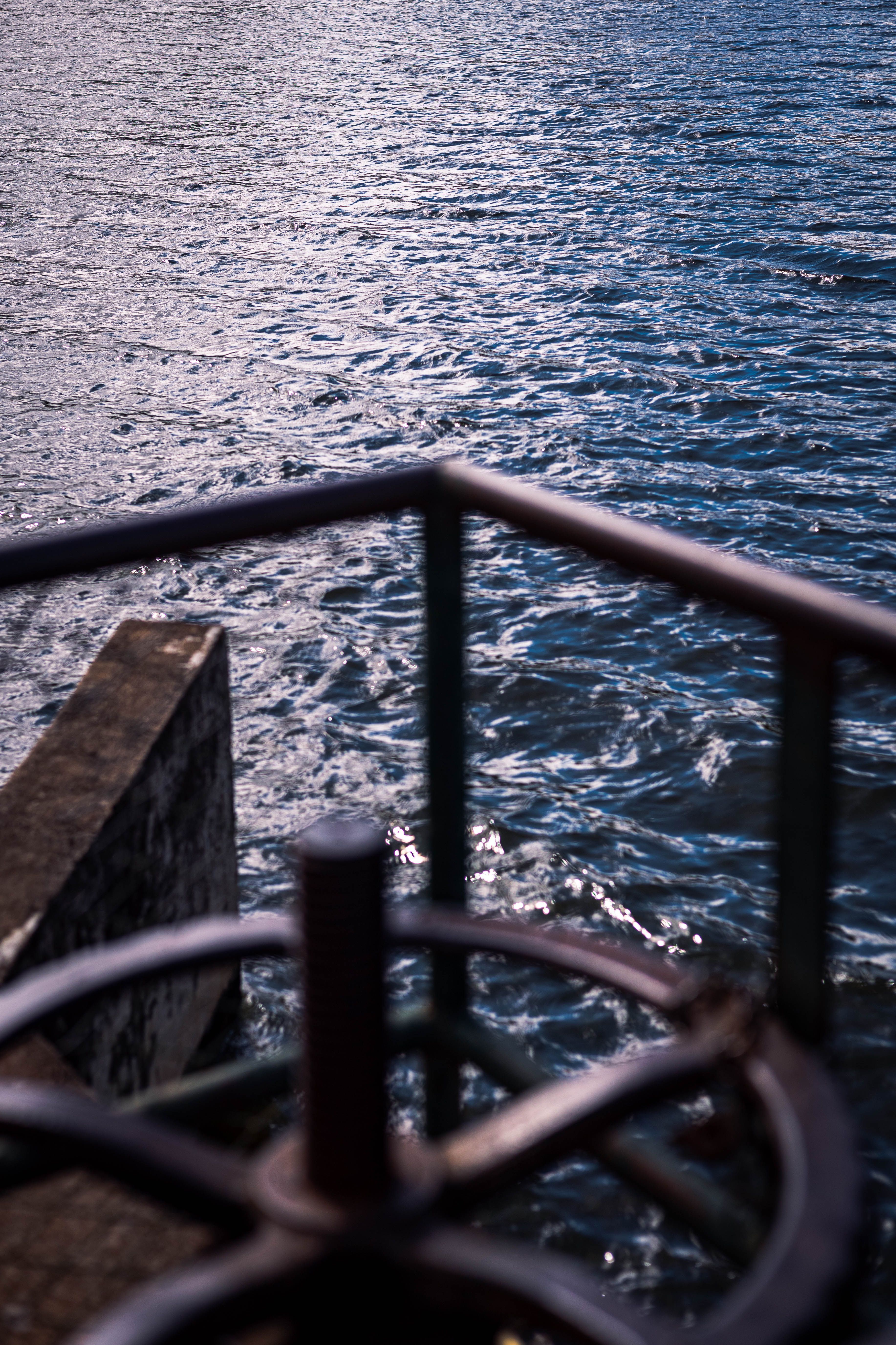 A Railing by a Lake · Free Stock Photo