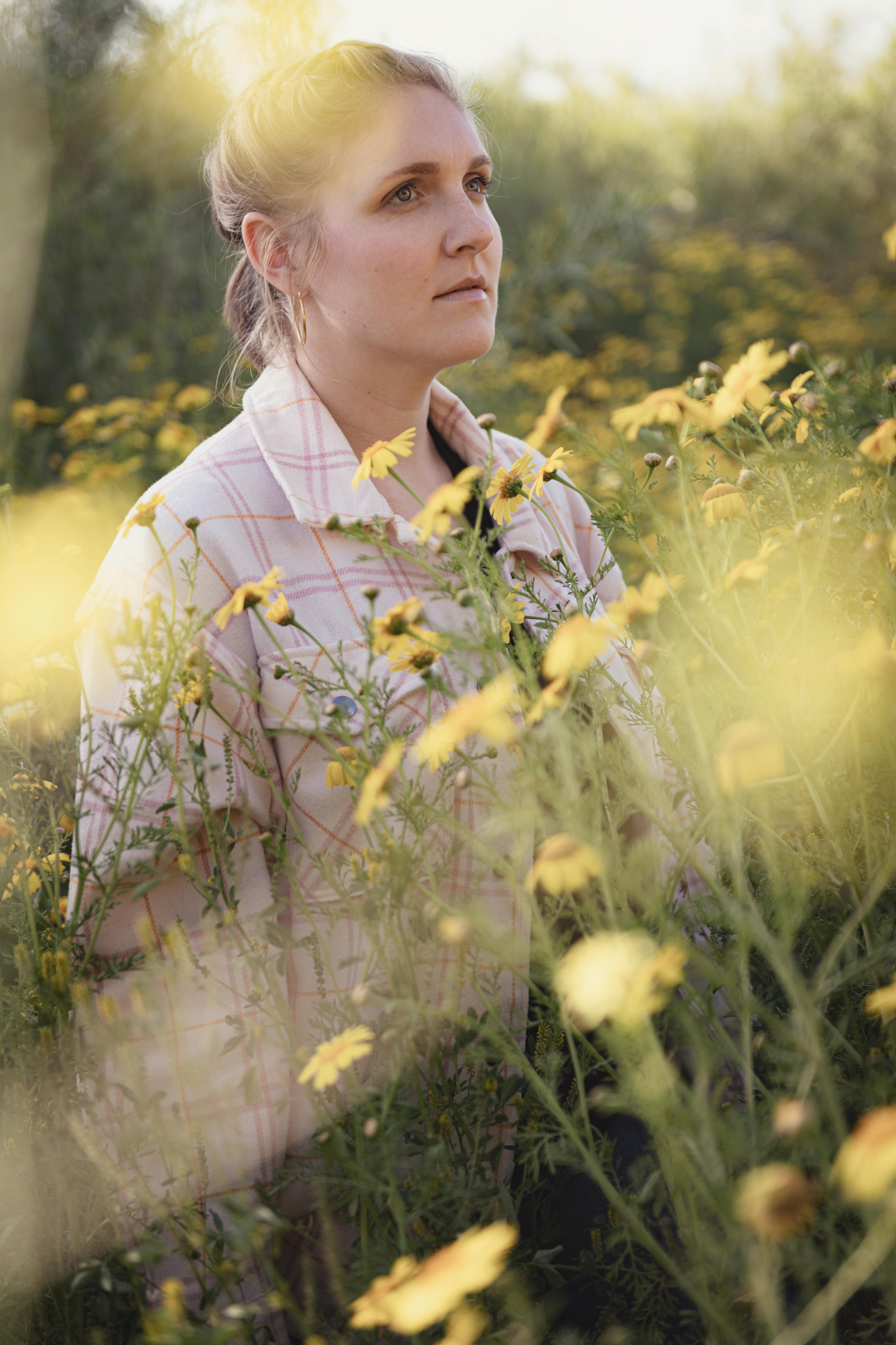 Photo of a Woman in a Meadow · Free Stock Photo