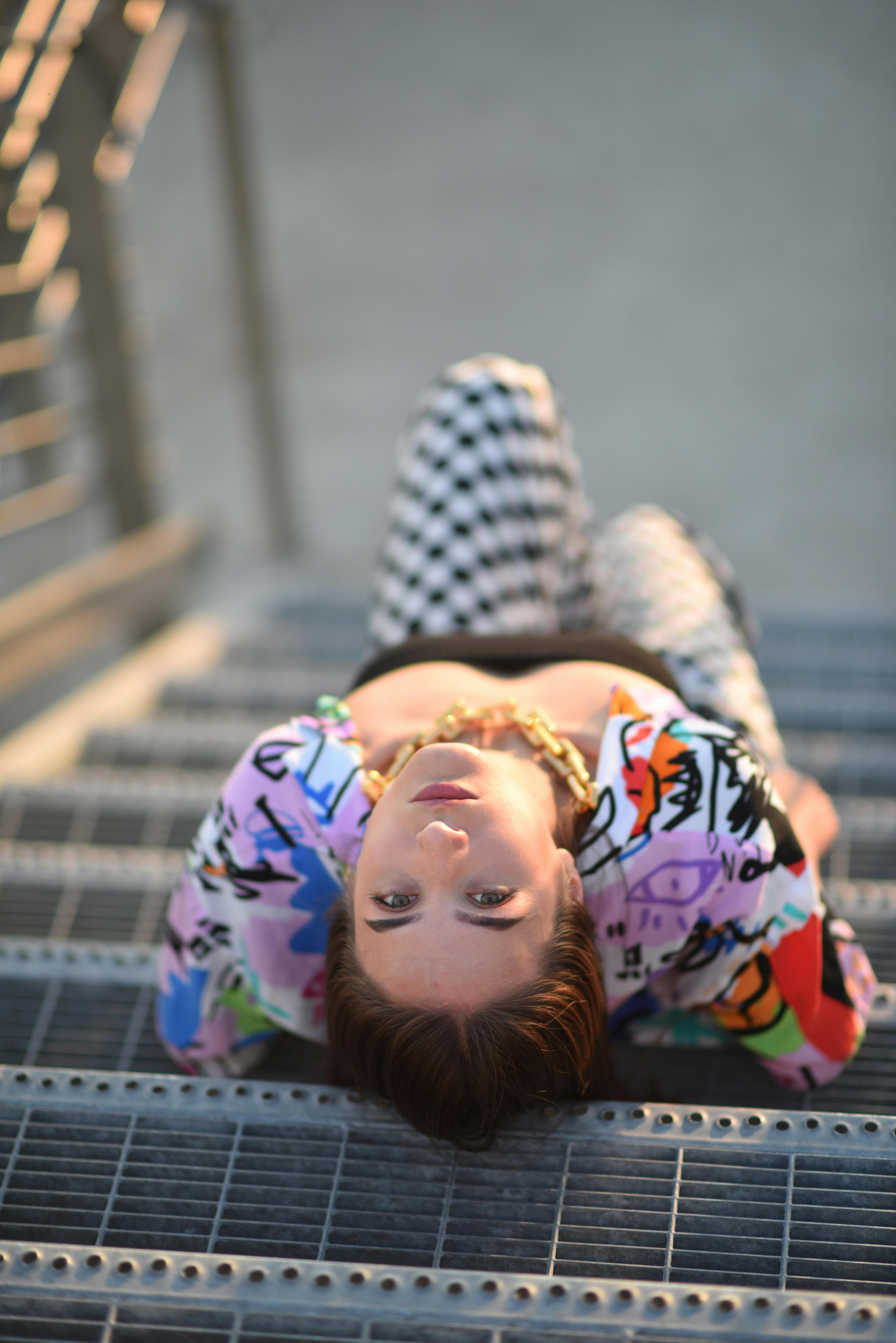 Woman Posing on Metal Steps · Free Stock Photo