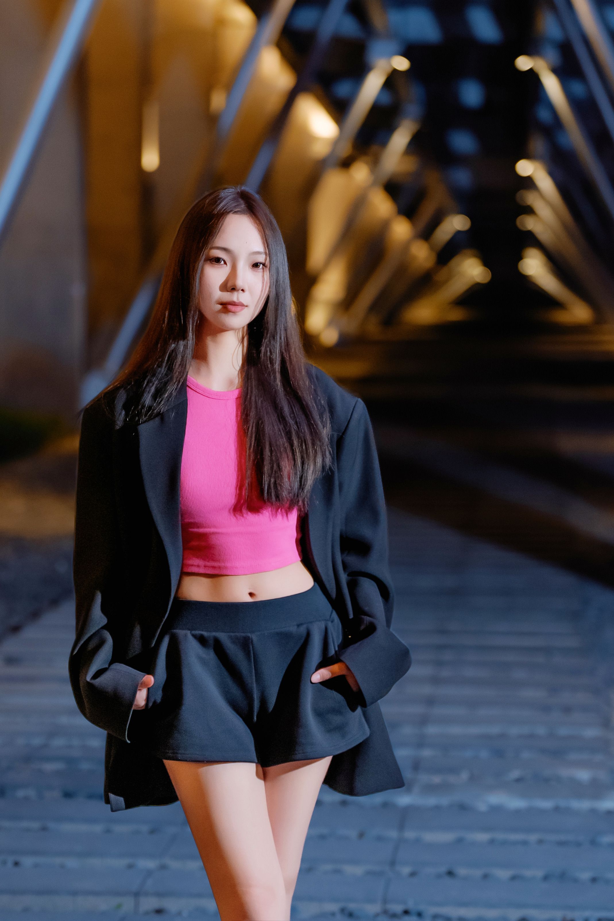 Young Woman in Coat, Mini Skirt, and Red Beret Posing in a Spring Park ...