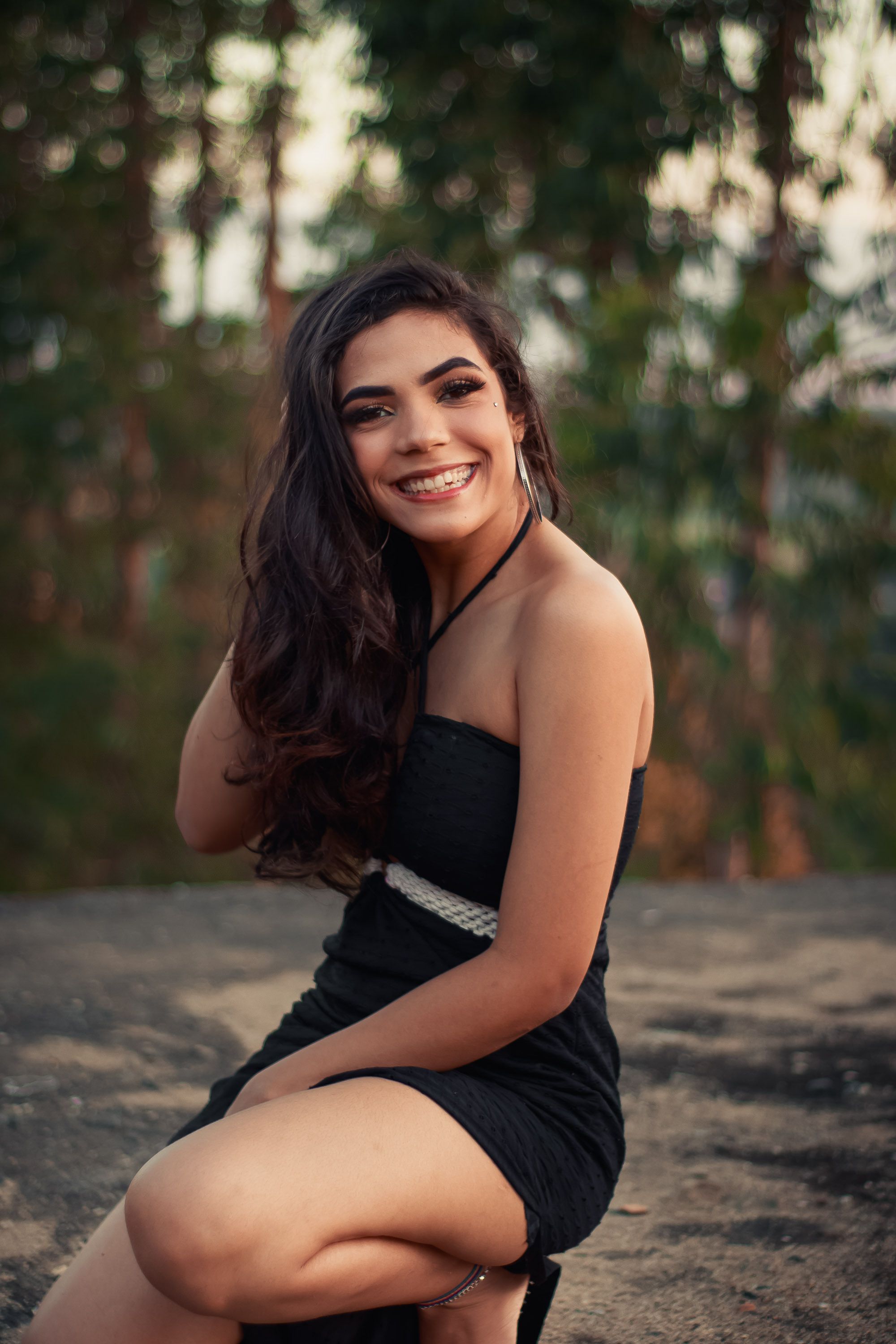 Brunette in Black Mini · Free Stock Photo