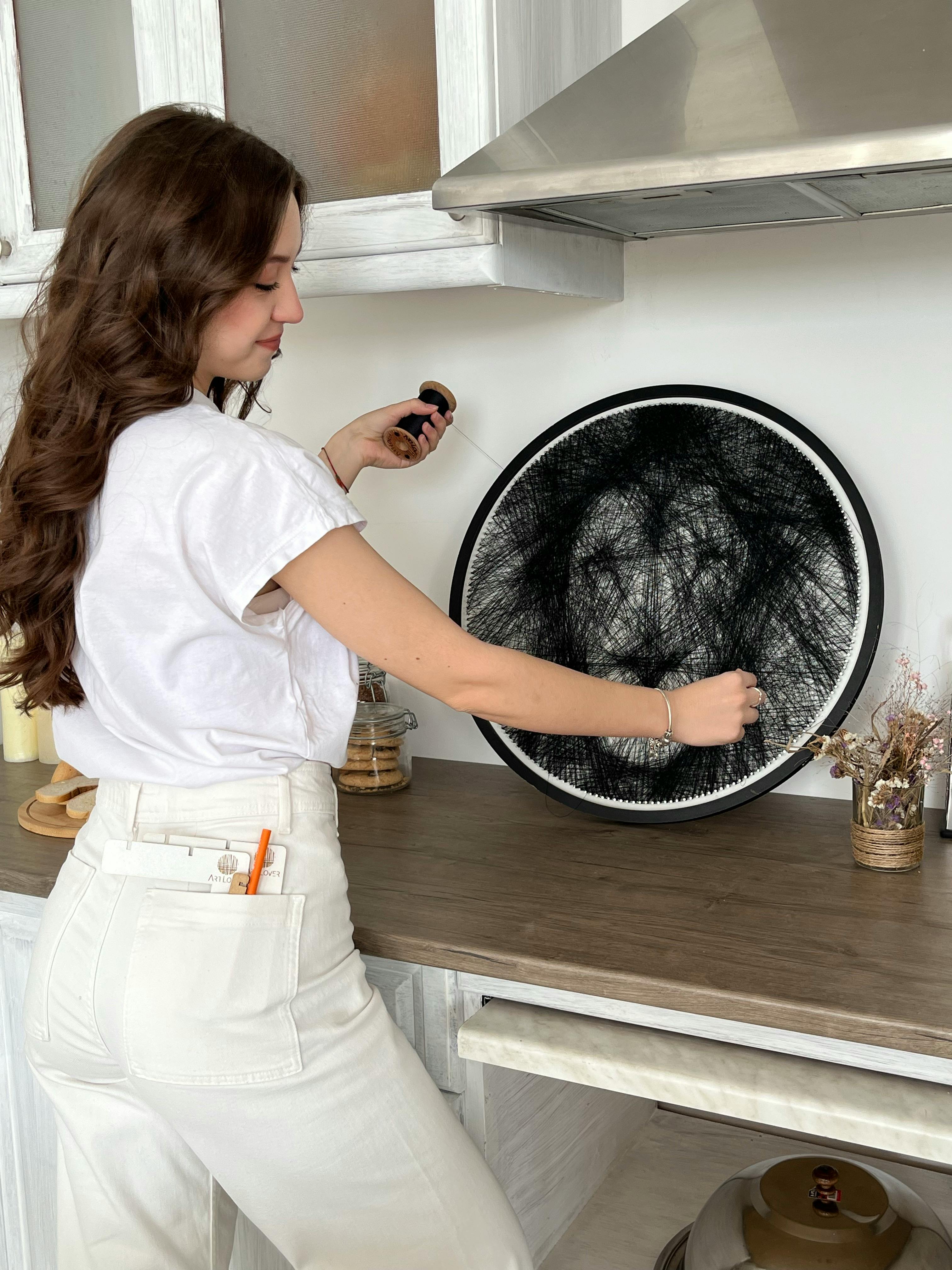 Artist Creating Computational String Art Piece · Free Stock Photo