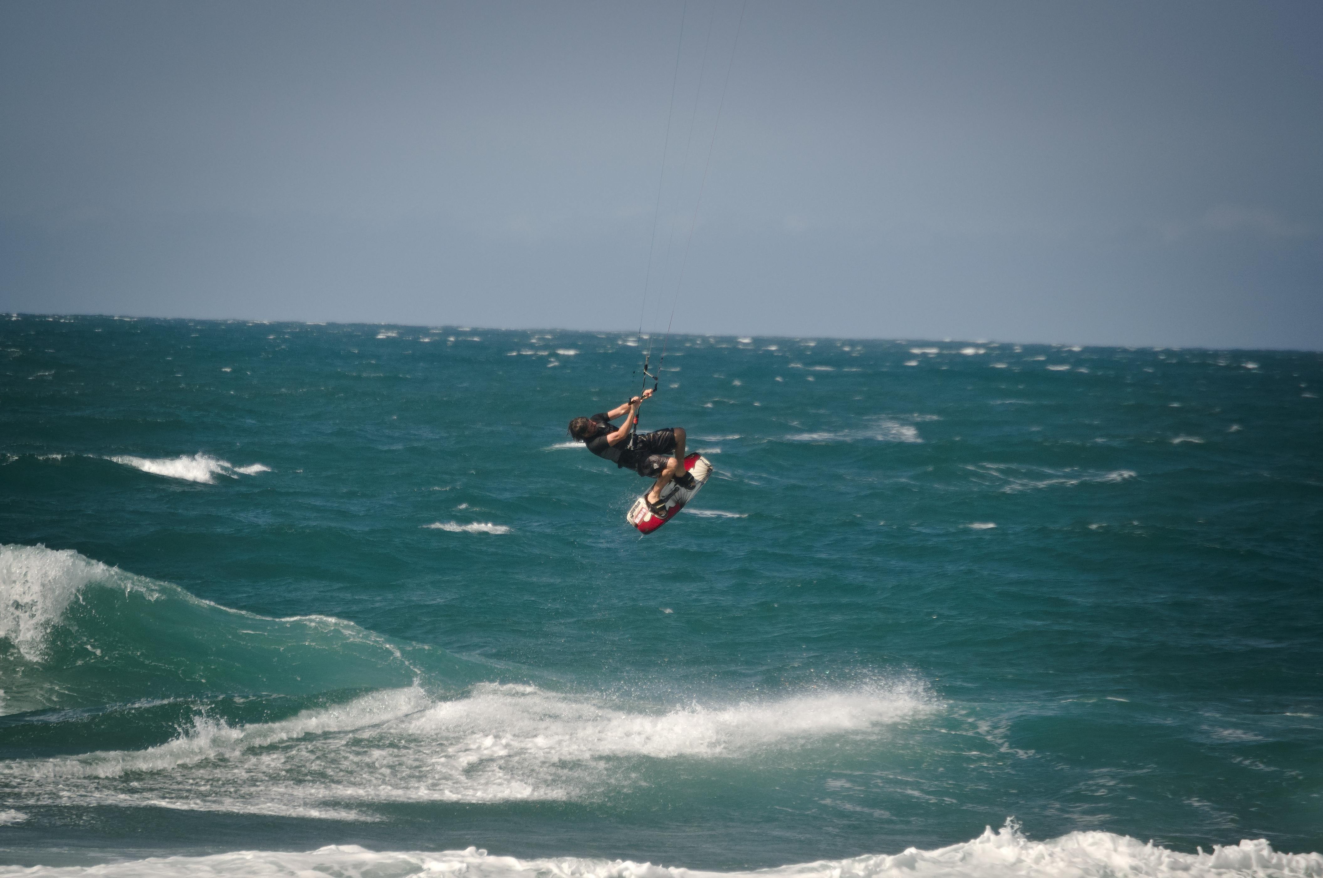 A Person Parasailing in the Ocean · Free Stock Photo
