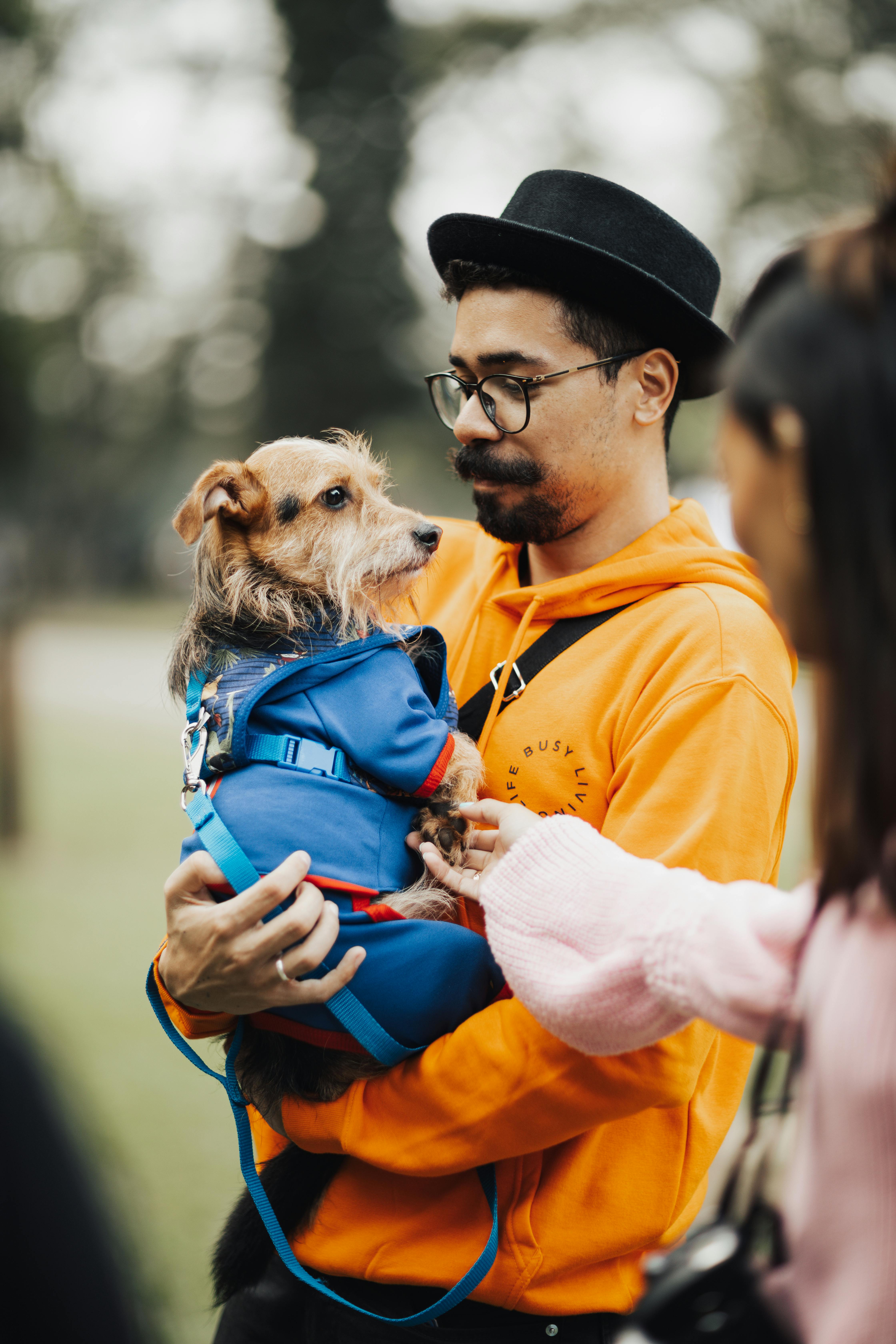 Man Holding His Dog · Free Stock Photo