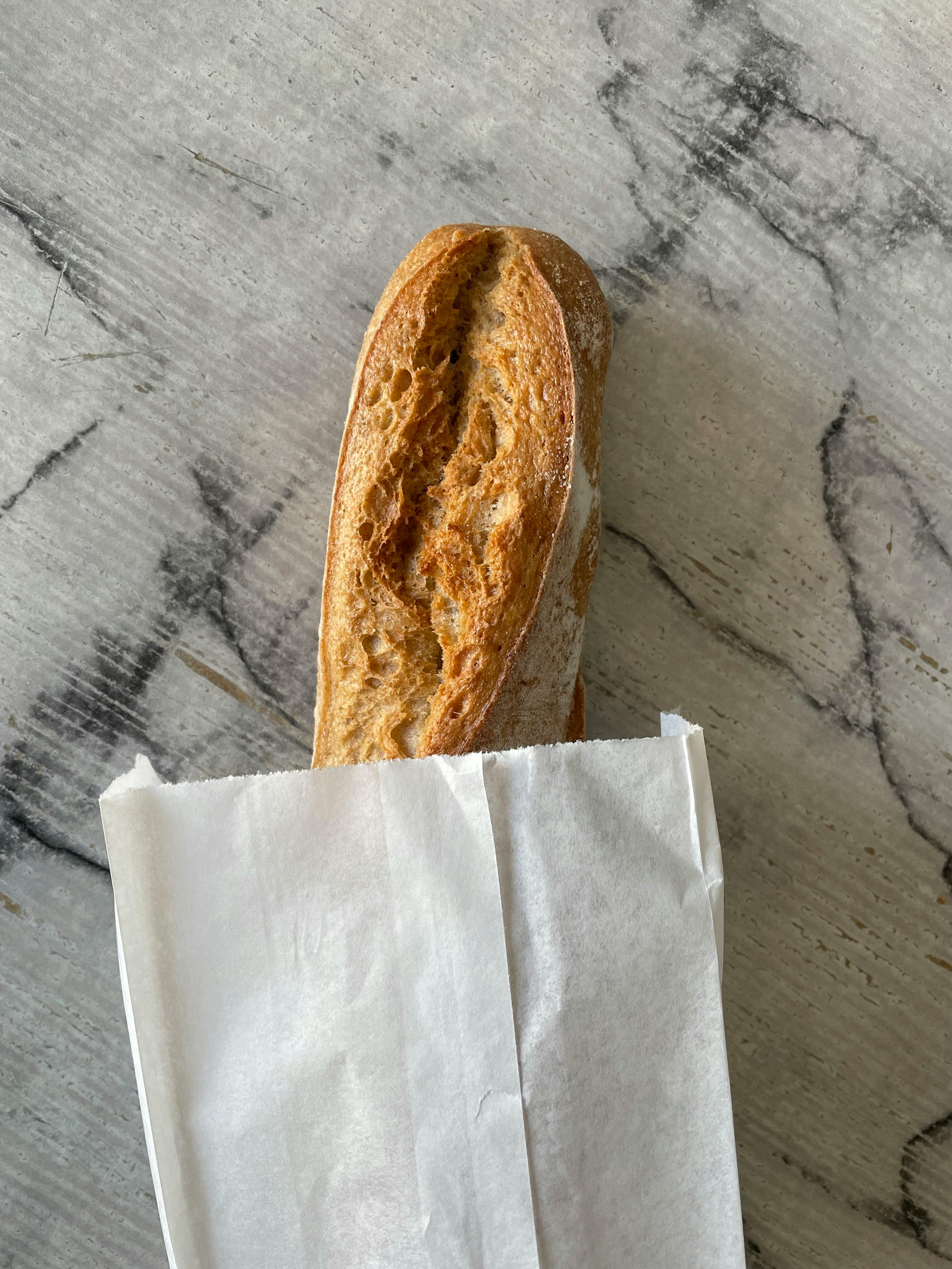 Baguette in Paper Bag · Free Stock Photo