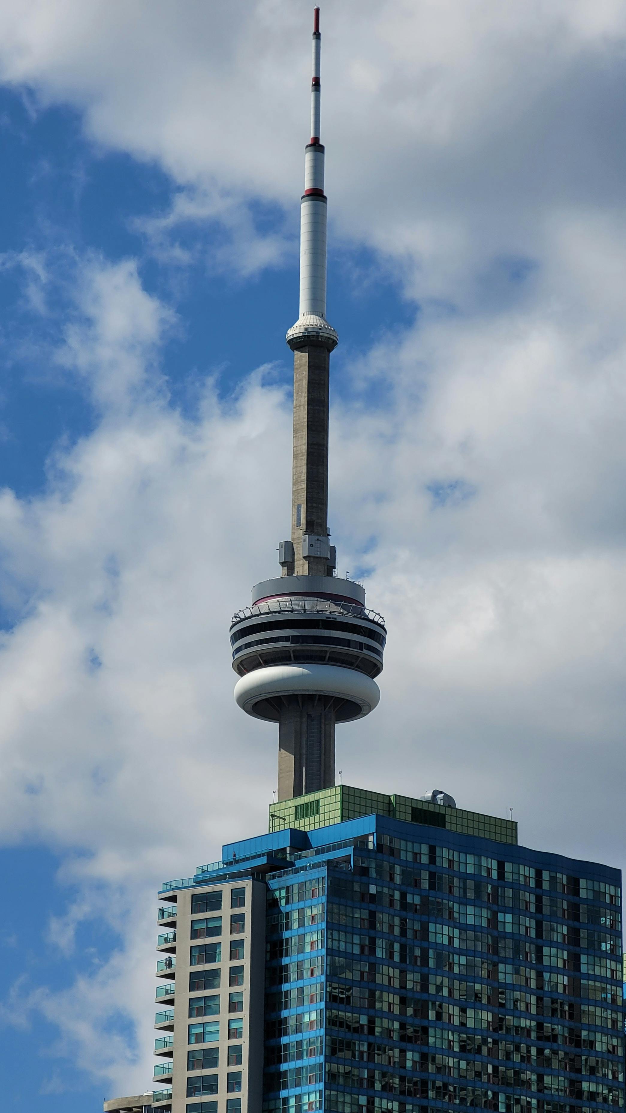 Silhouette of CN Tower Under the Cloudy Sky · Free Stock Photo