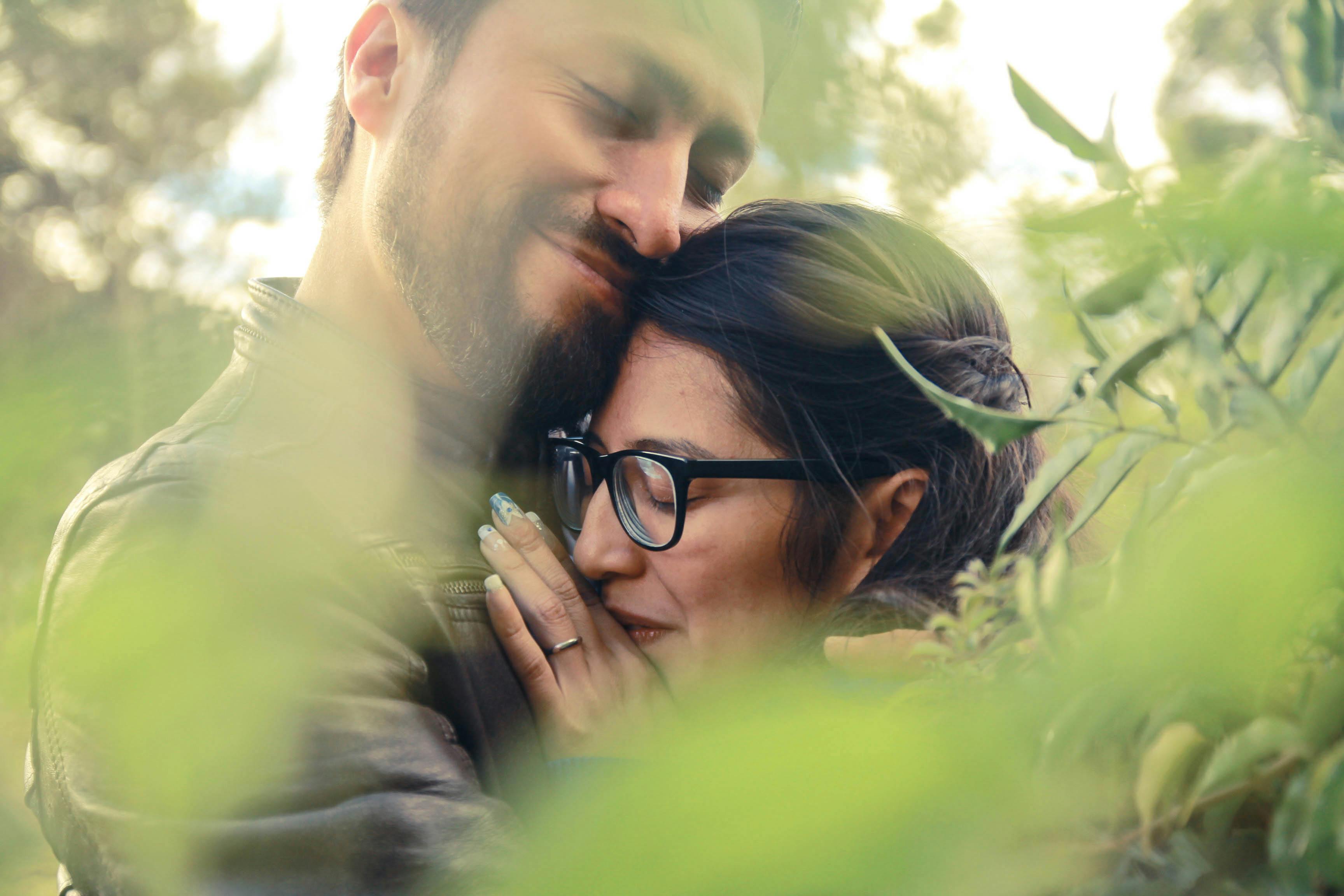 Faces of Hugging Couple · Free Stock Photo