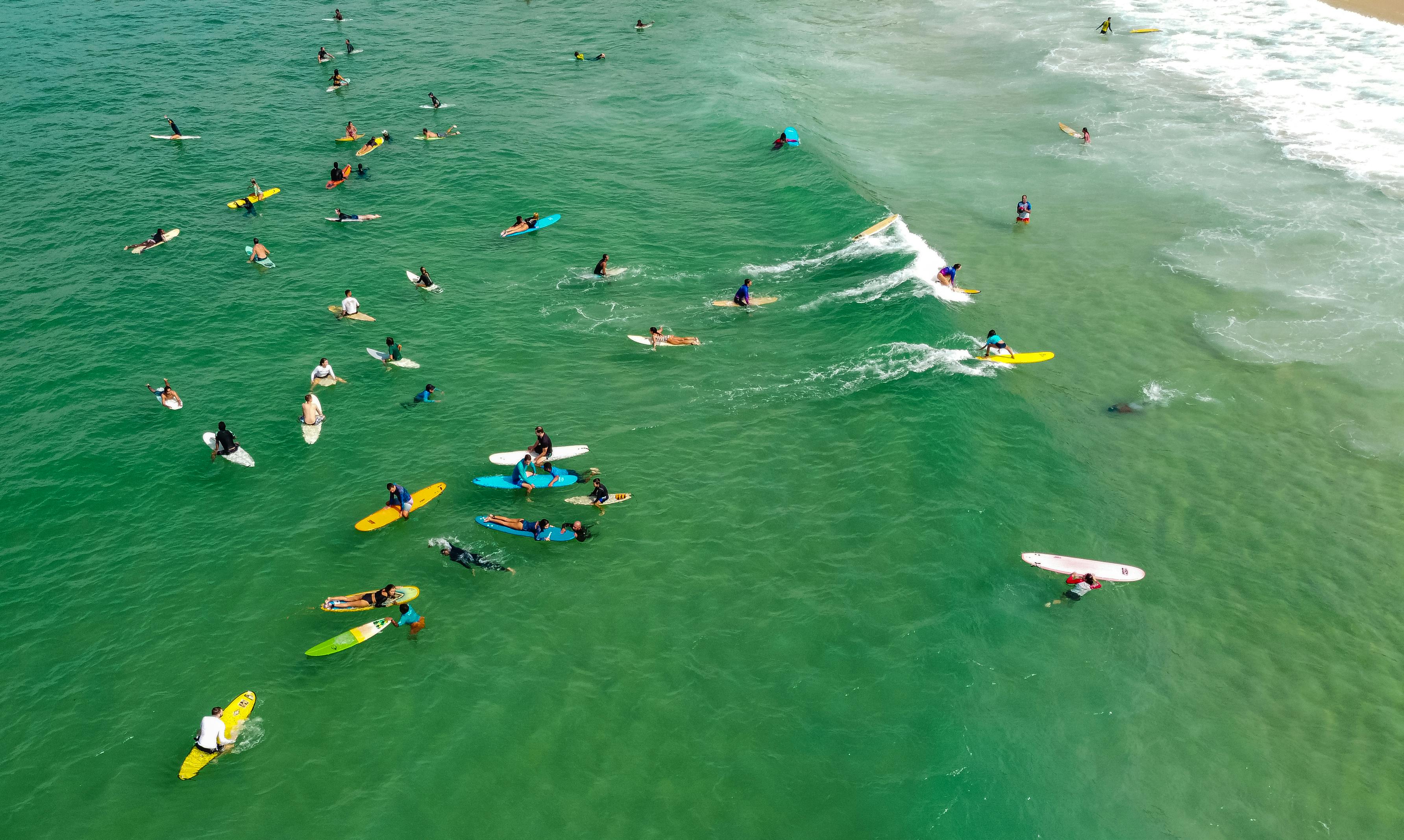 Aerial View People Surfing on the Sea · Free Stock Photo