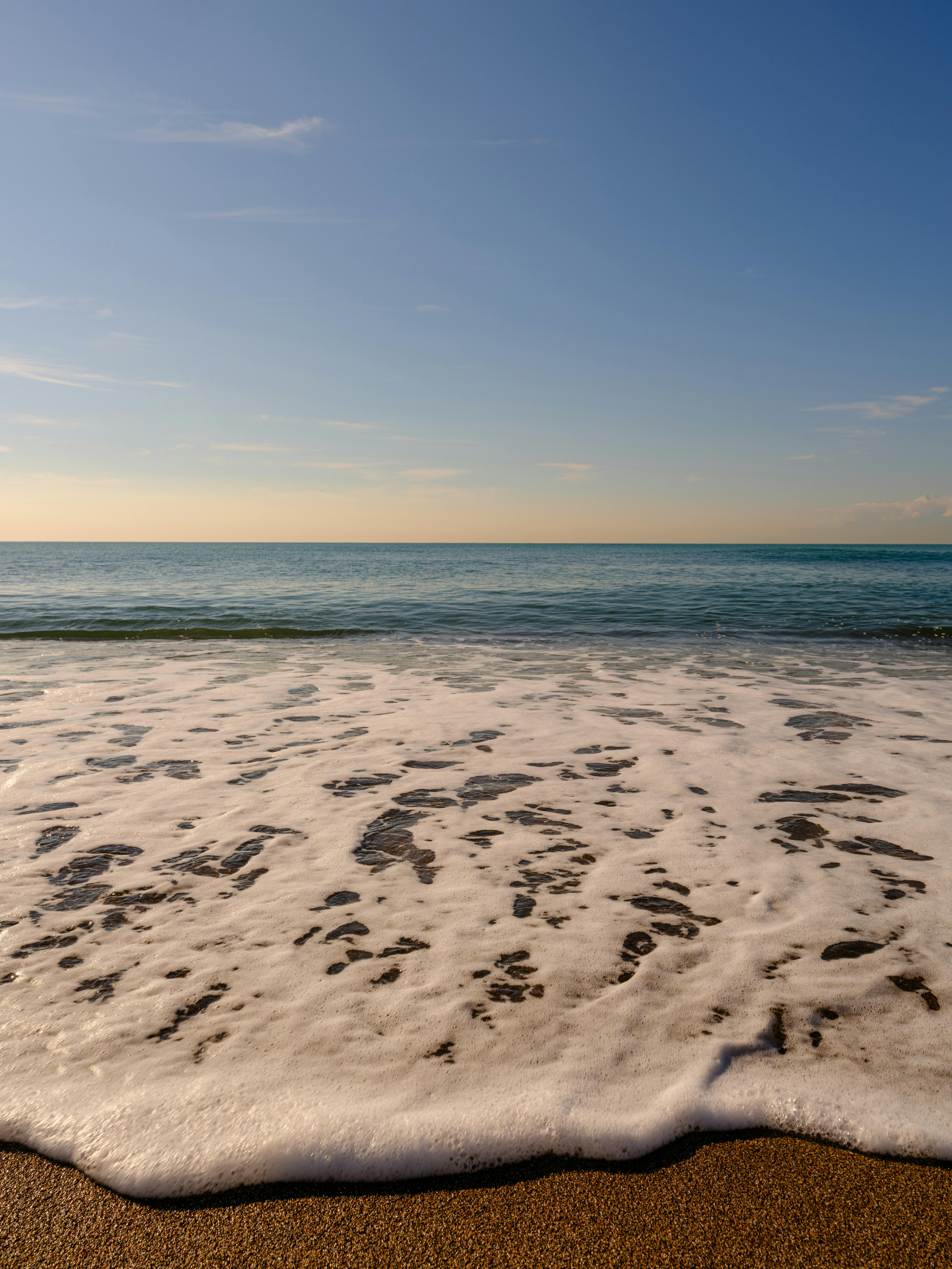 Water Foam on Sea Shore · Free Stock Photo
