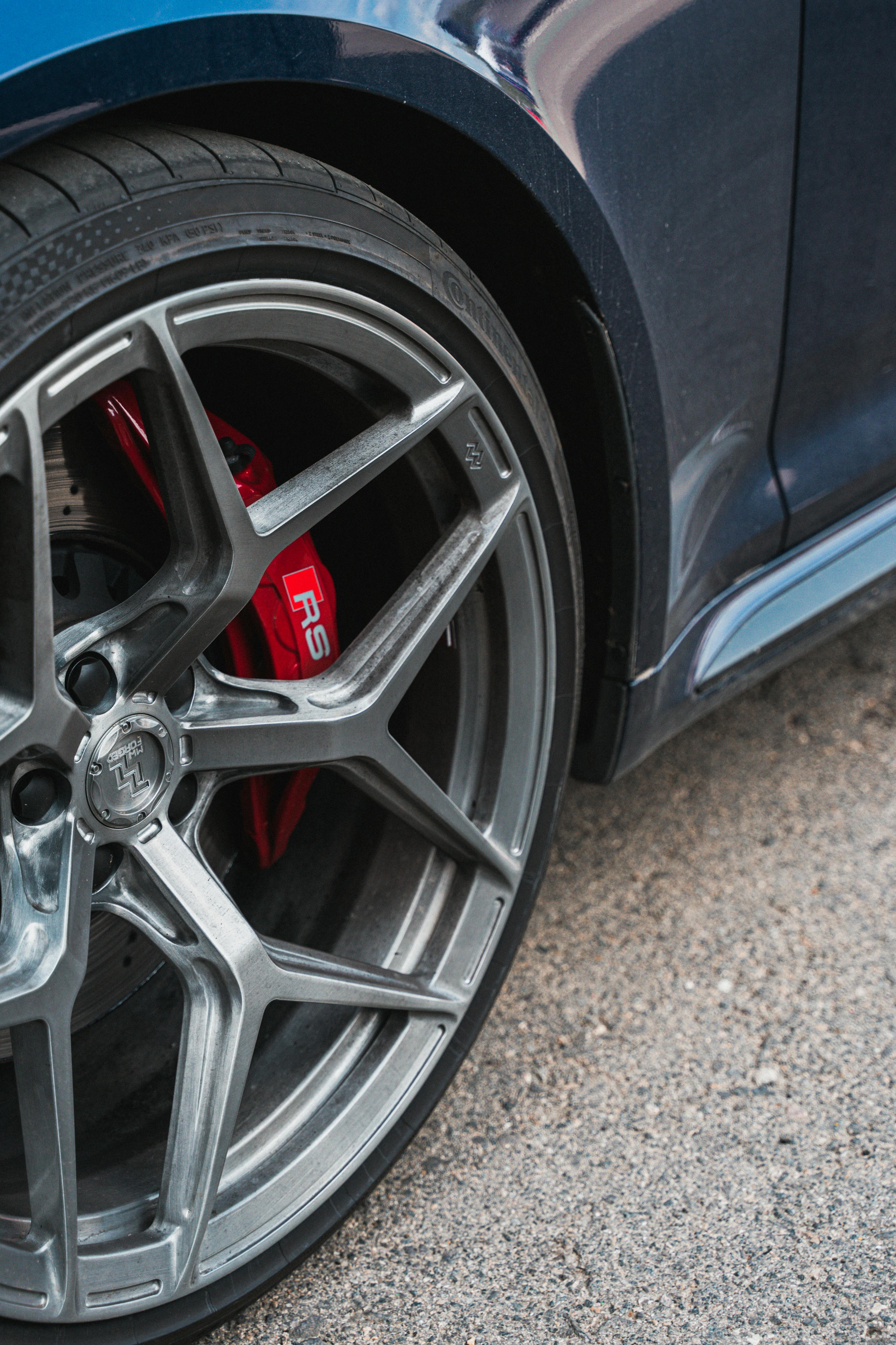 Close-Up Photo of Ferrari Rim · Free Stock Photo