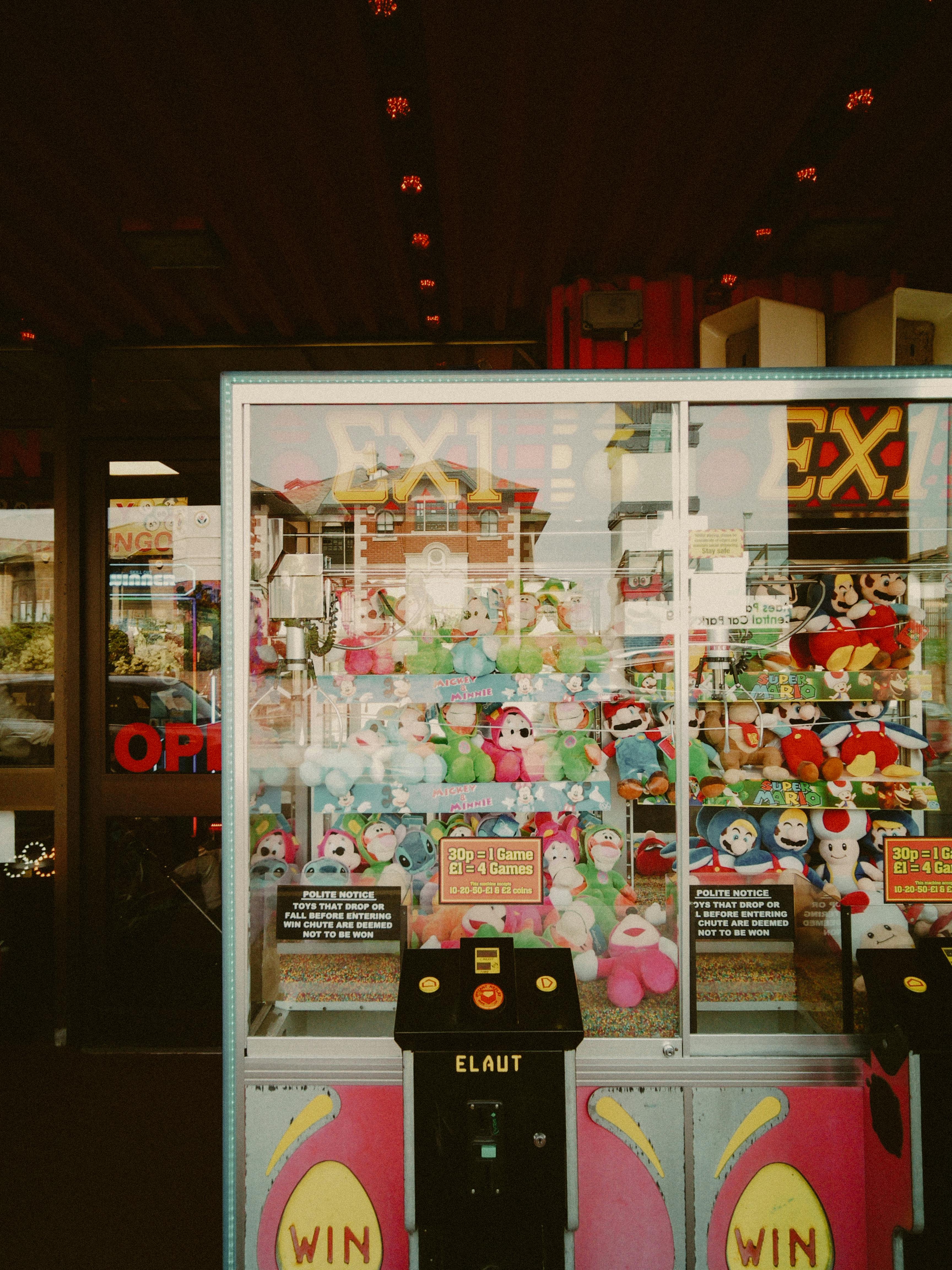 Arcade Machine with Plush Toys · Free Stock Photo