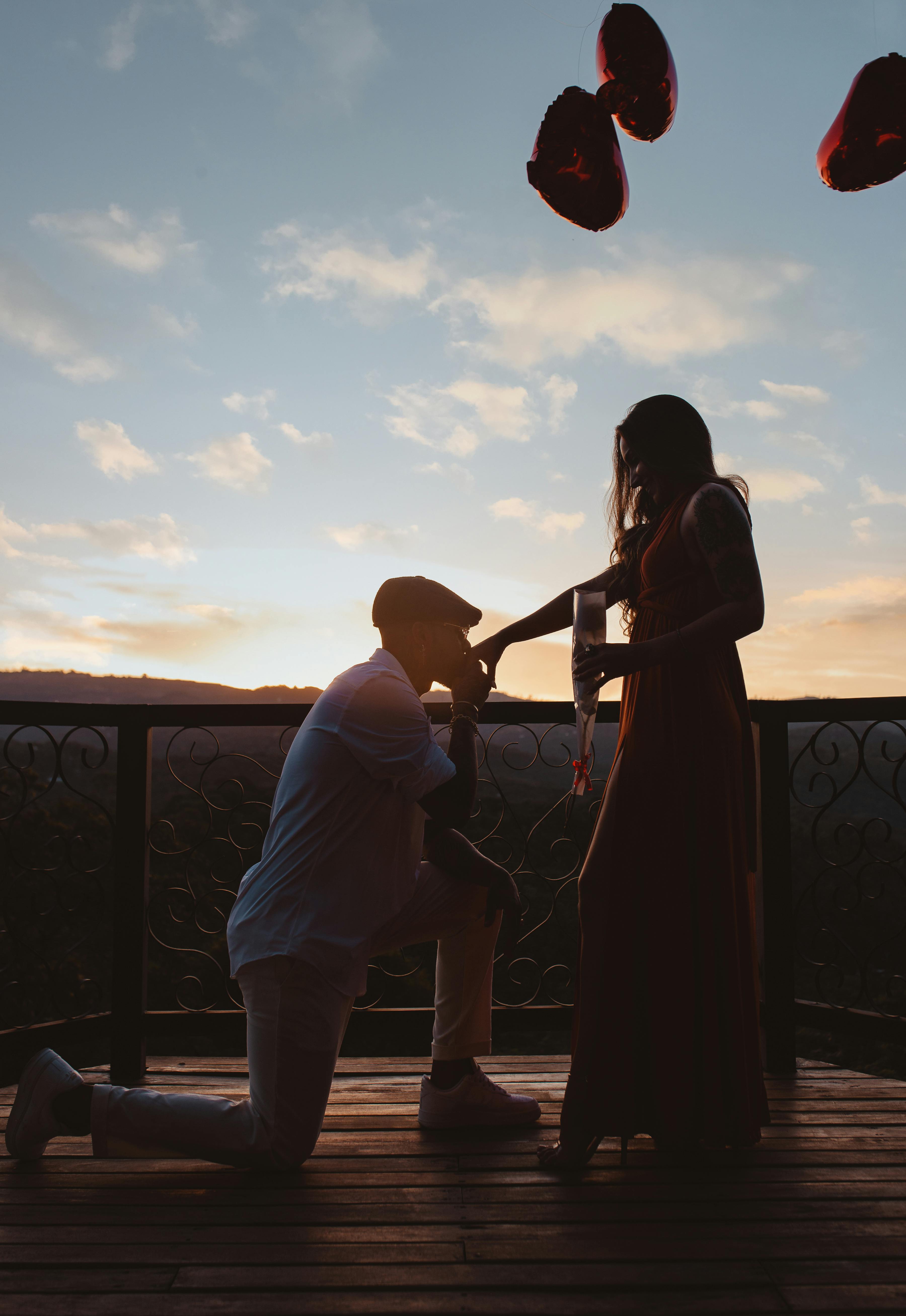Man Proposing to a Woman in Mountains · Free Stock Photo
