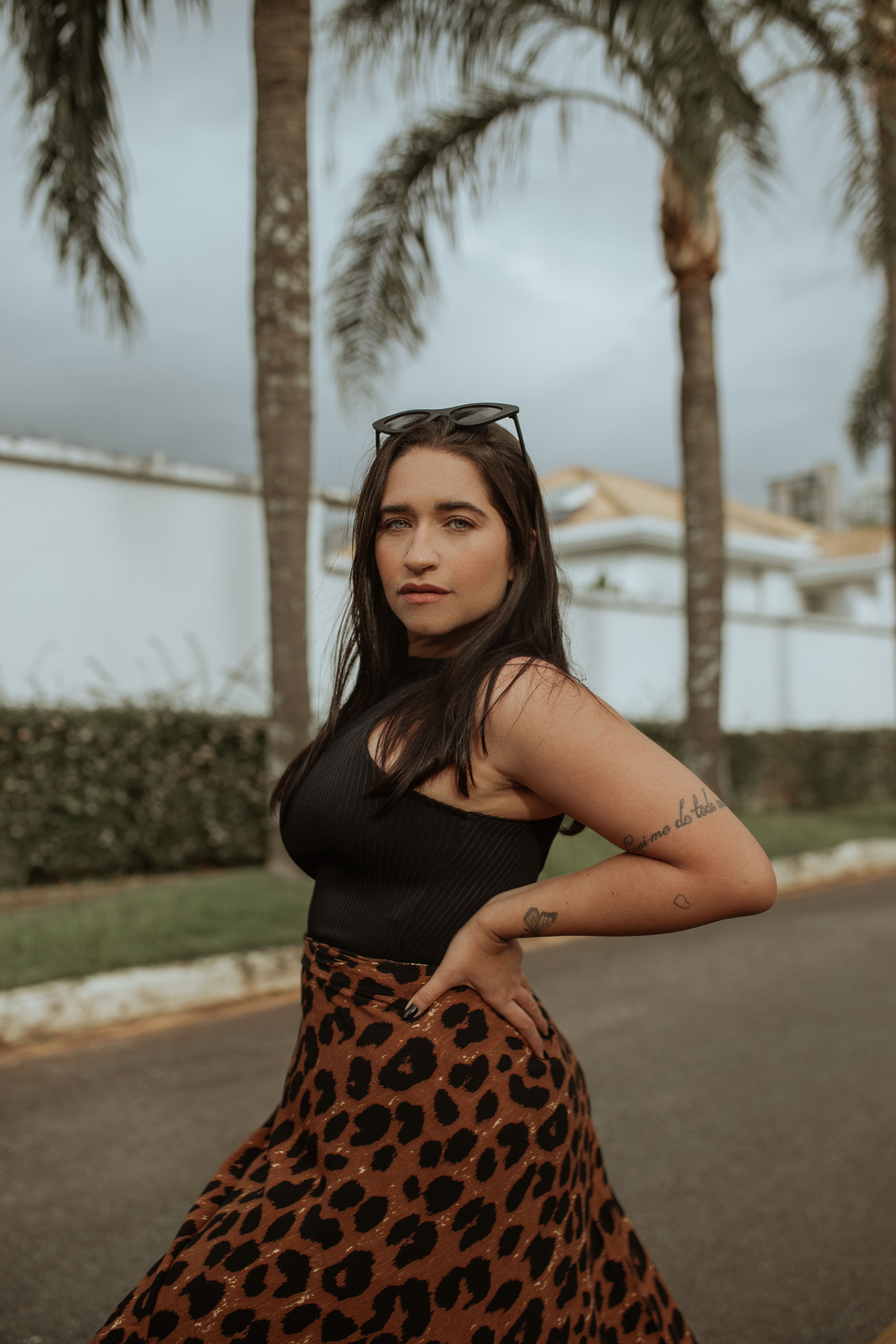 Brunette in Leopard Pattern Skirt · Free Stock Photo