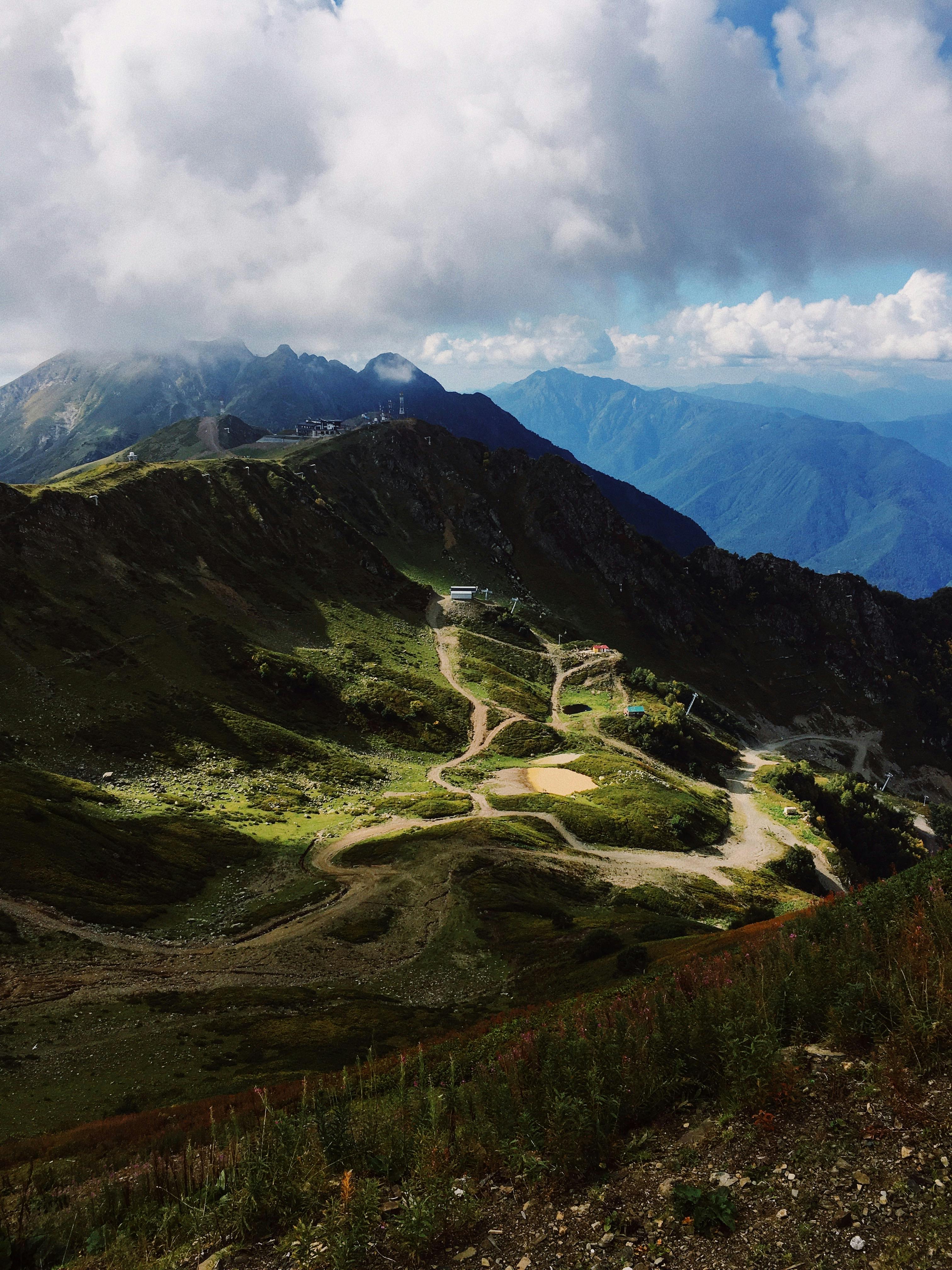 Aerial View of Mountain and Dark Clouds · Free Stock Photo