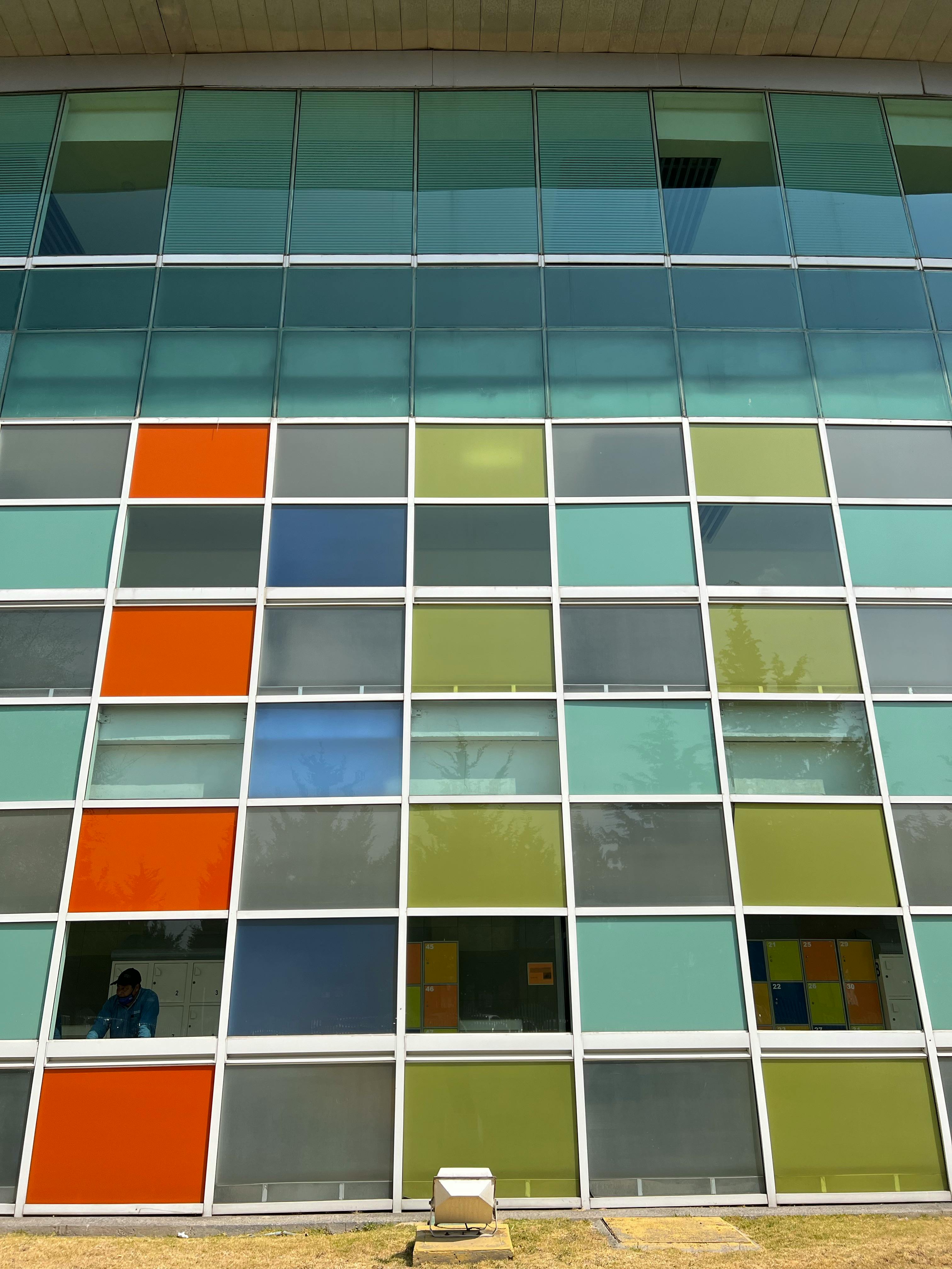 Exterior Wall of Colorful Glass Panels · Free Stock Photo