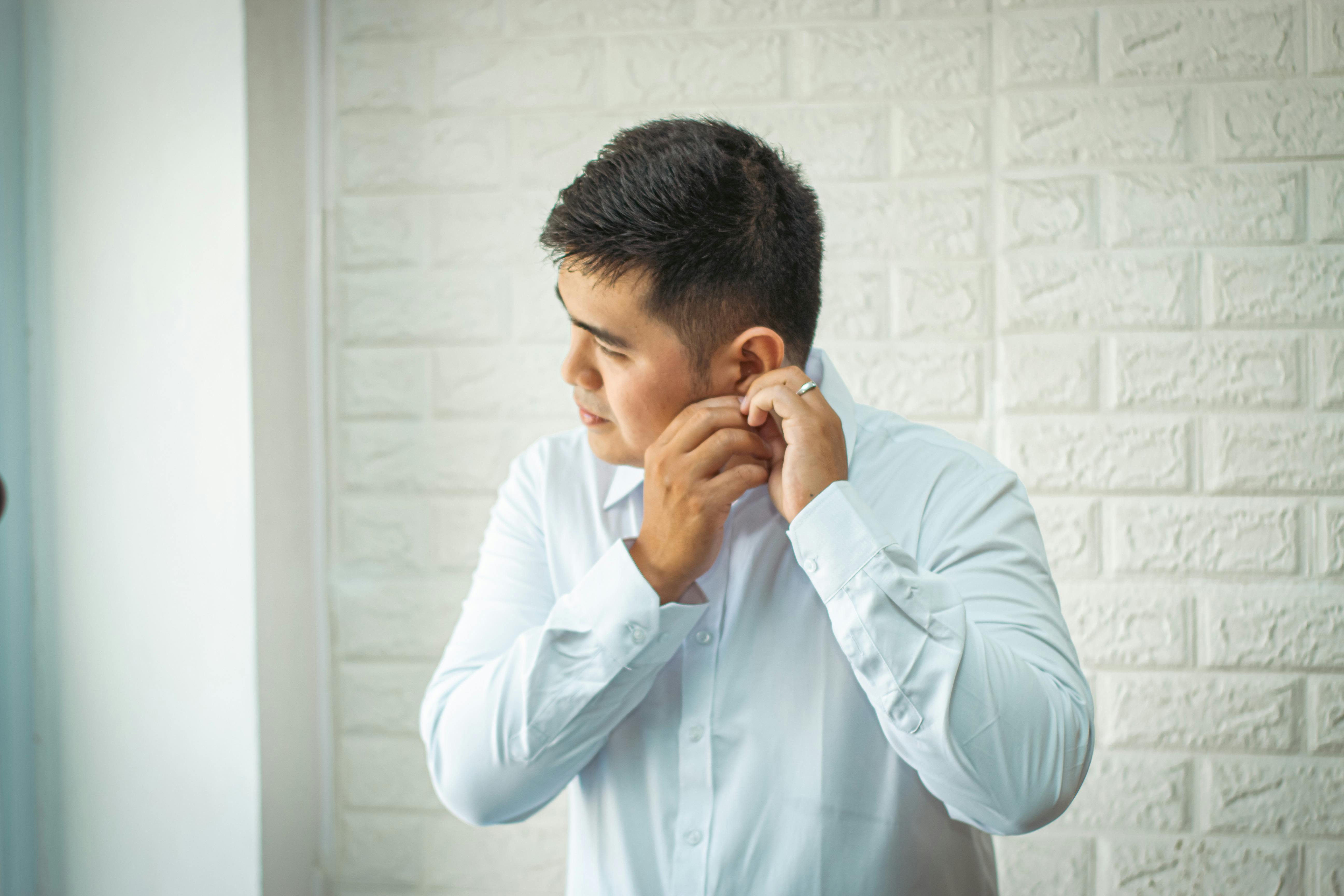 Man Touching his Ear · Free Stock Photo