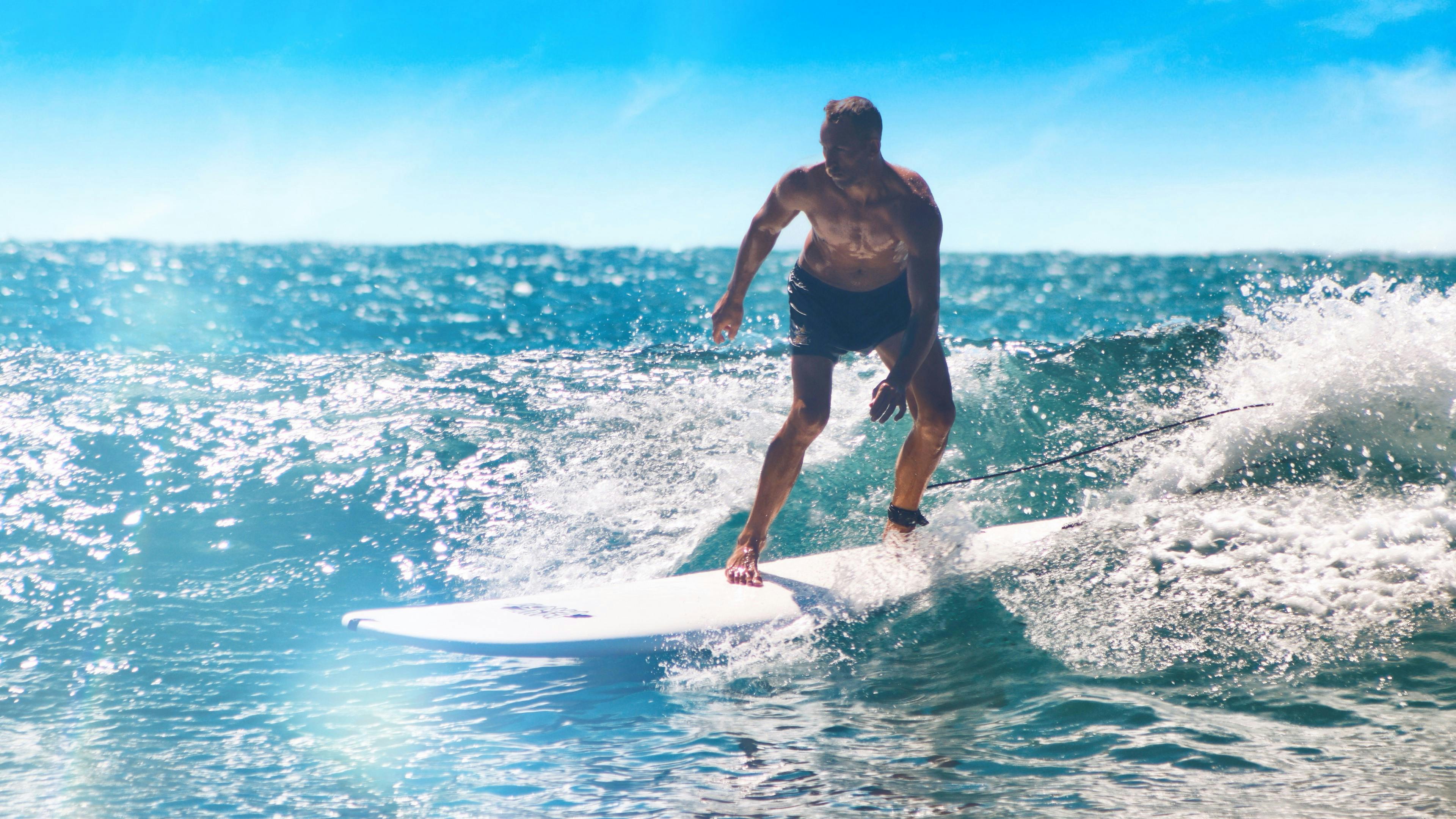 Man Surfing on Wave · Free Stock Photo