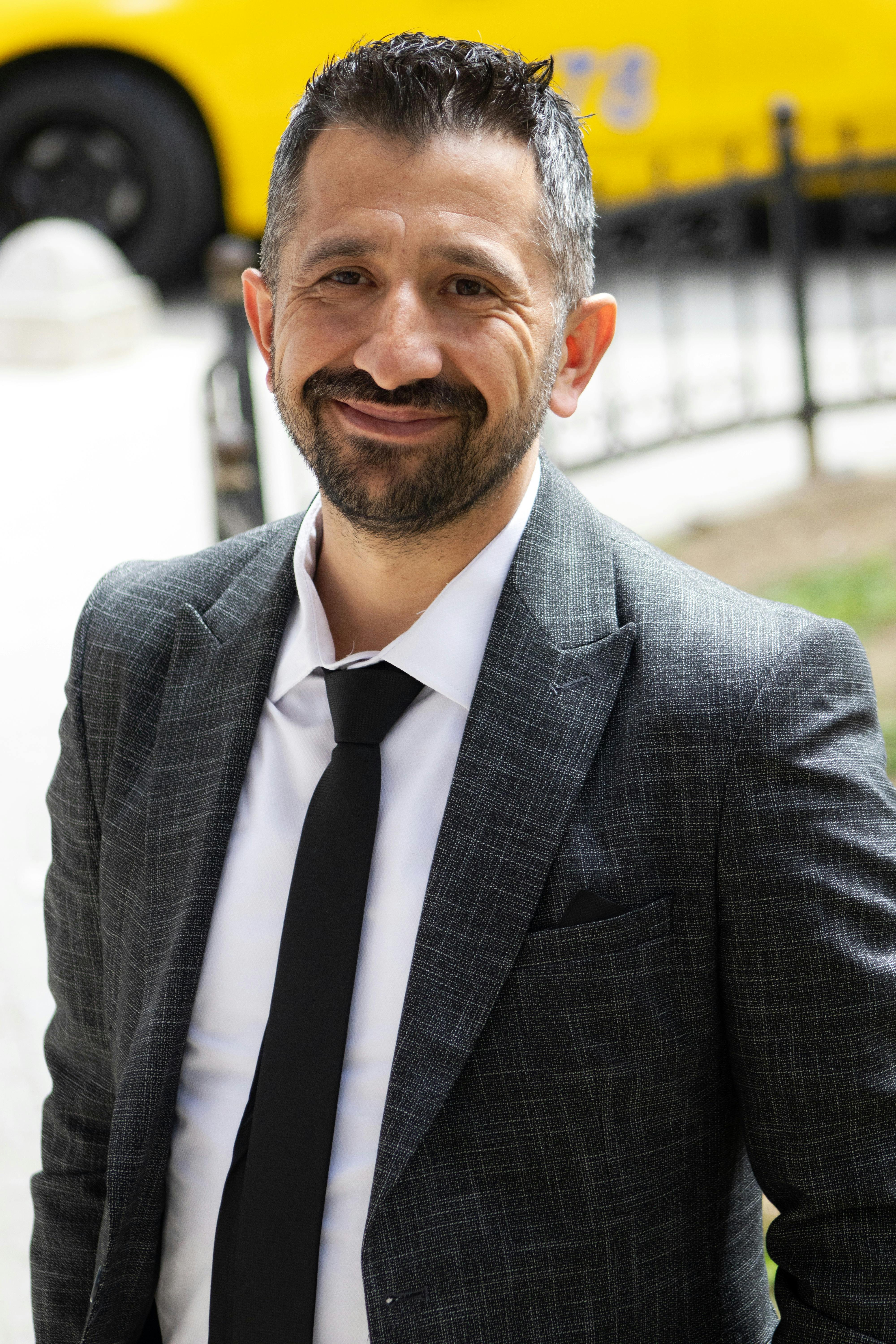 Smiling Man in Suit with Tie · Free Stock Photo