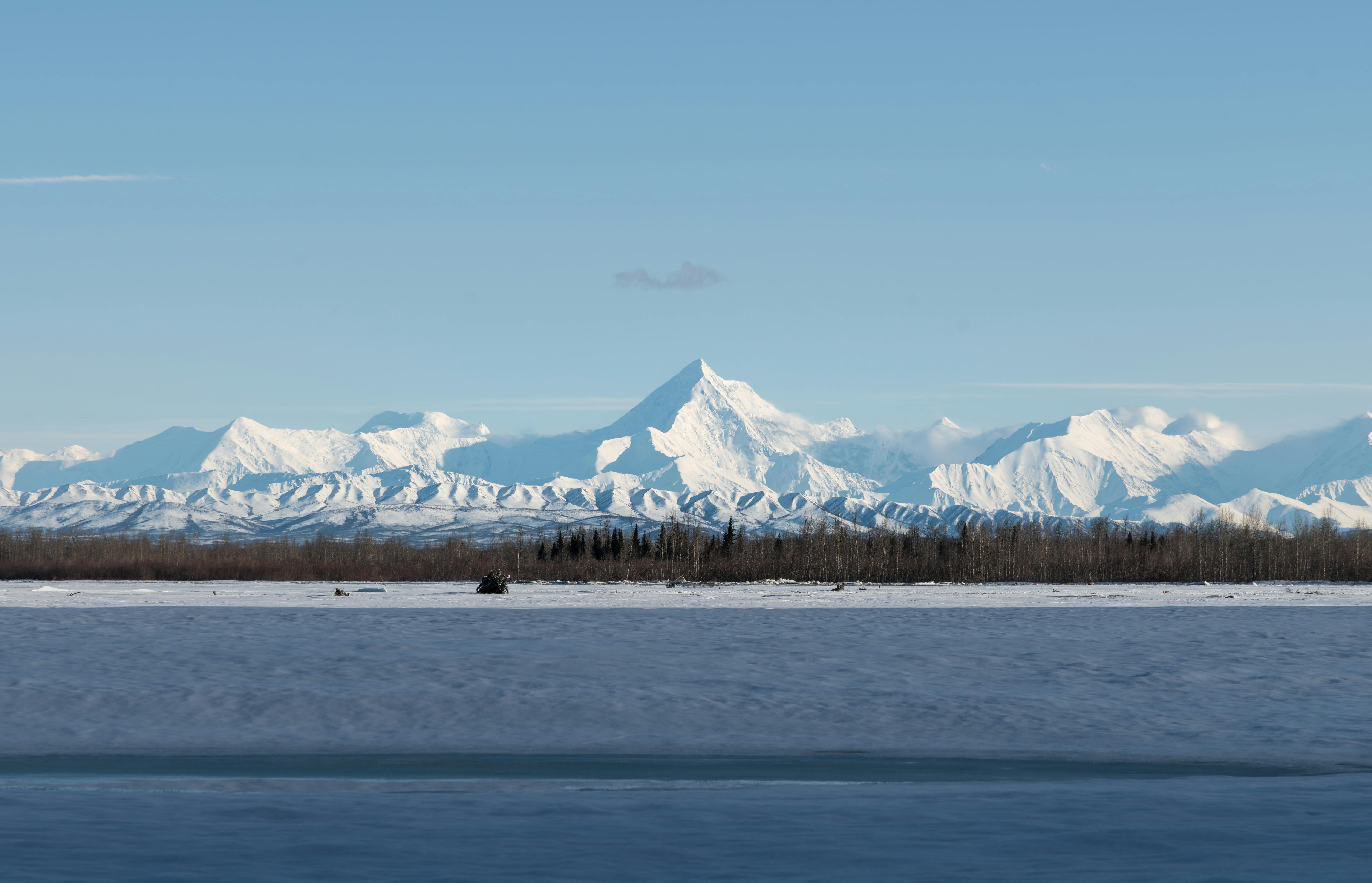 Majestic Snowy Mountains on Horizon · Free Stock Photo