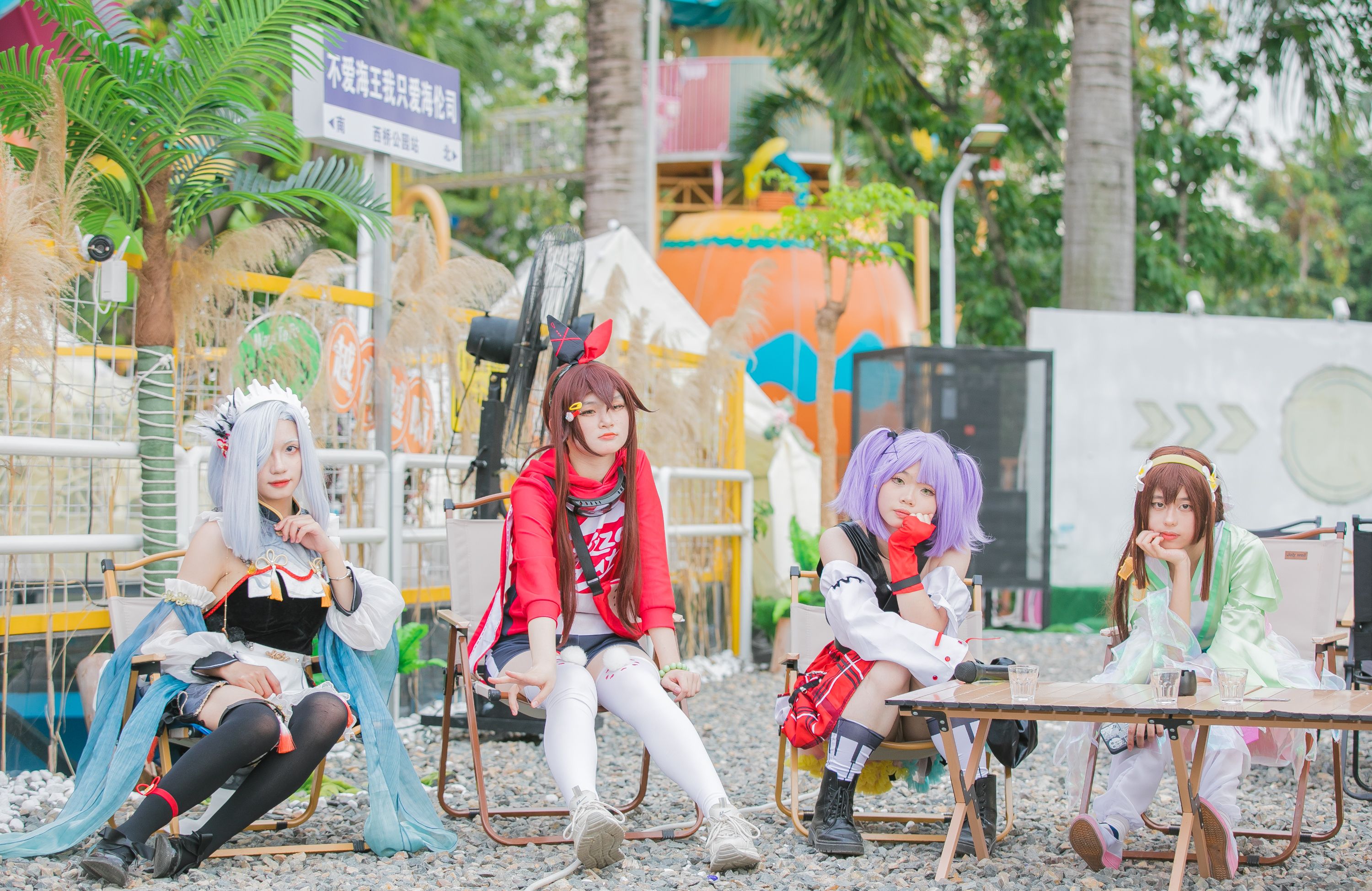 Beautiful Women in Costumes Sitting on Chairs · Free Stock Photo