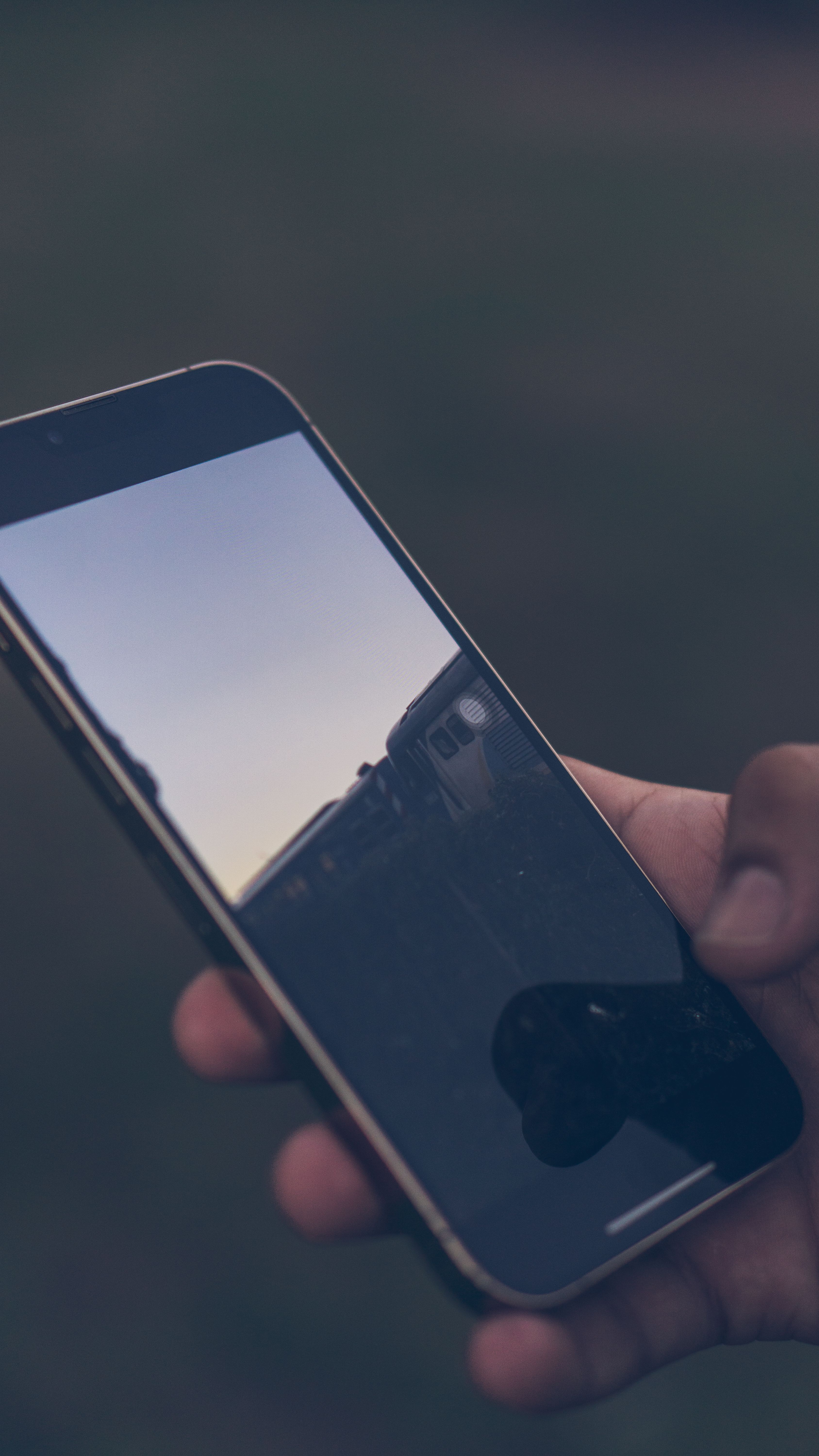 Person Using a Spotify on His Smartphone · Free Stock Photo