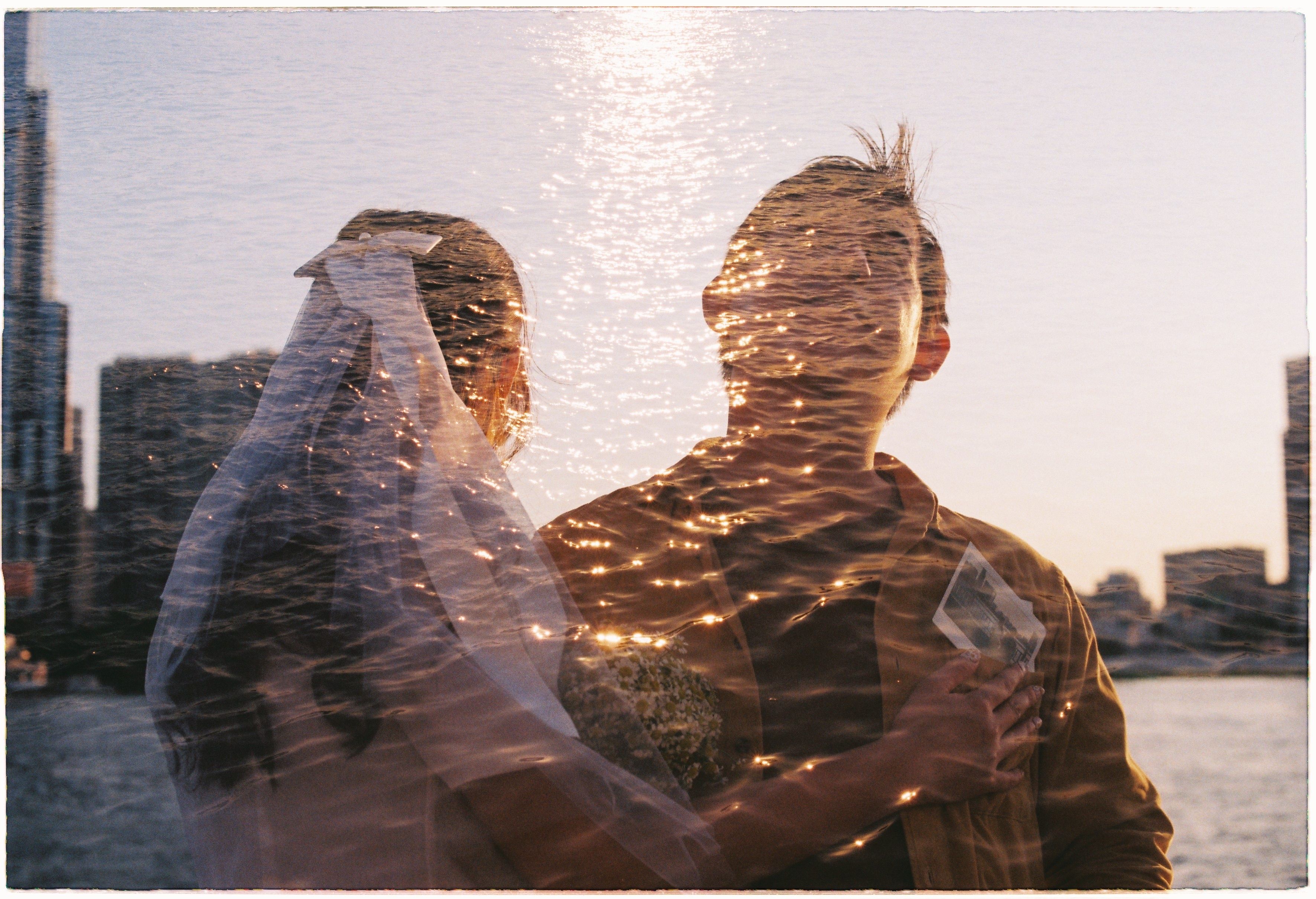 Water Reflection over Posing Newlyweds · Free Stock Photo