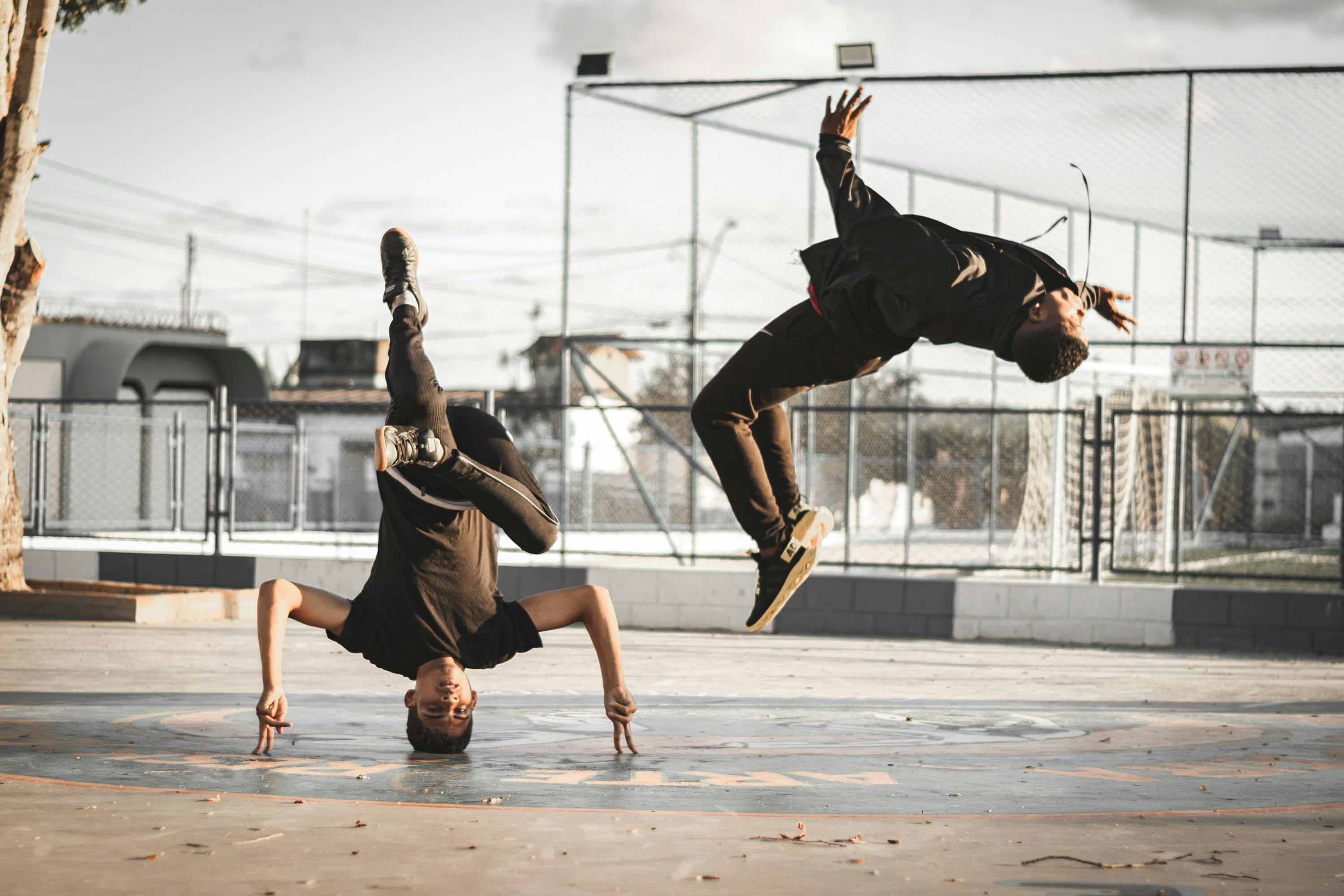 Men in Black Clothes Breakdancing · Free Stock Photo