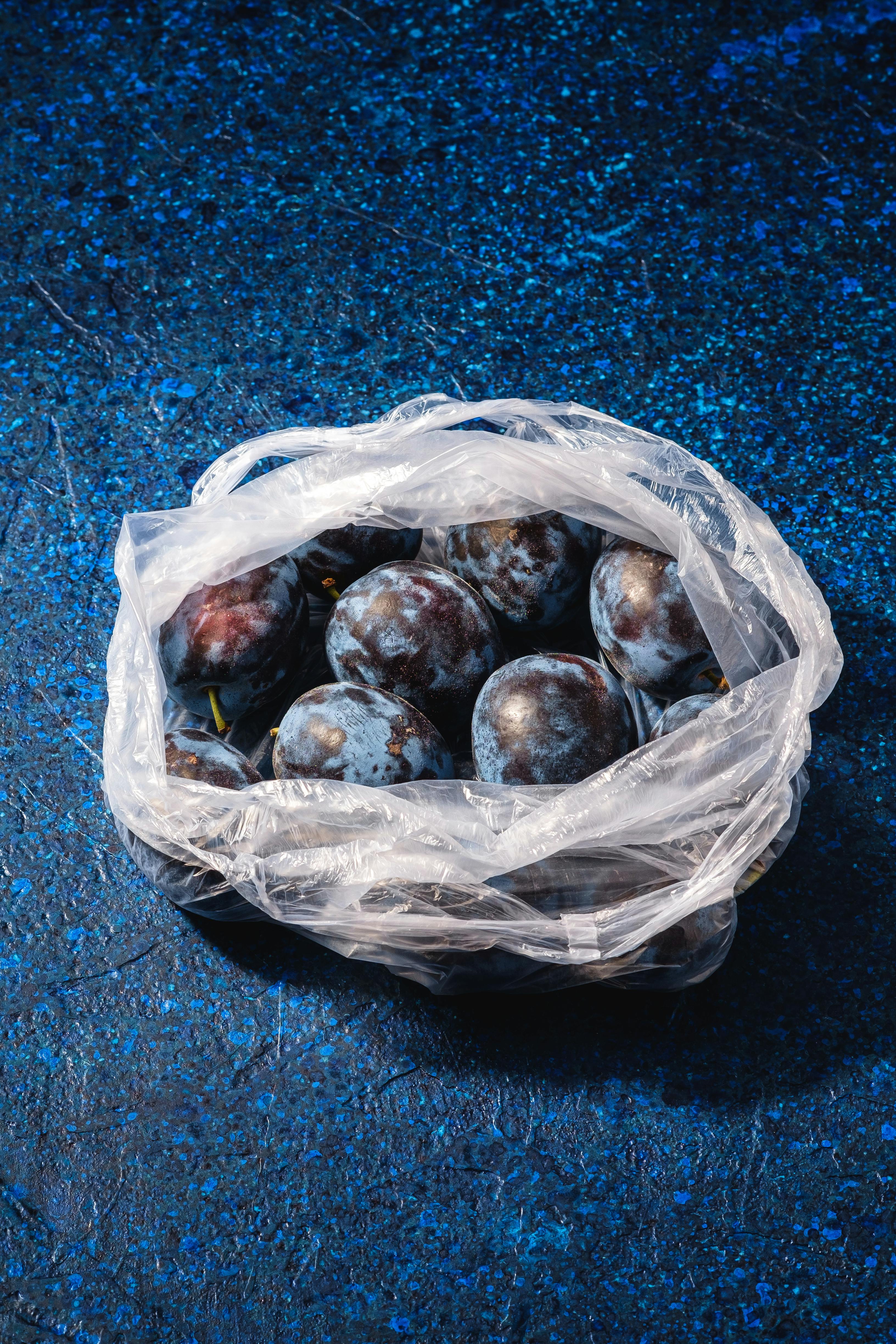 Plums in a Plastic Bag · Free Stock Photo