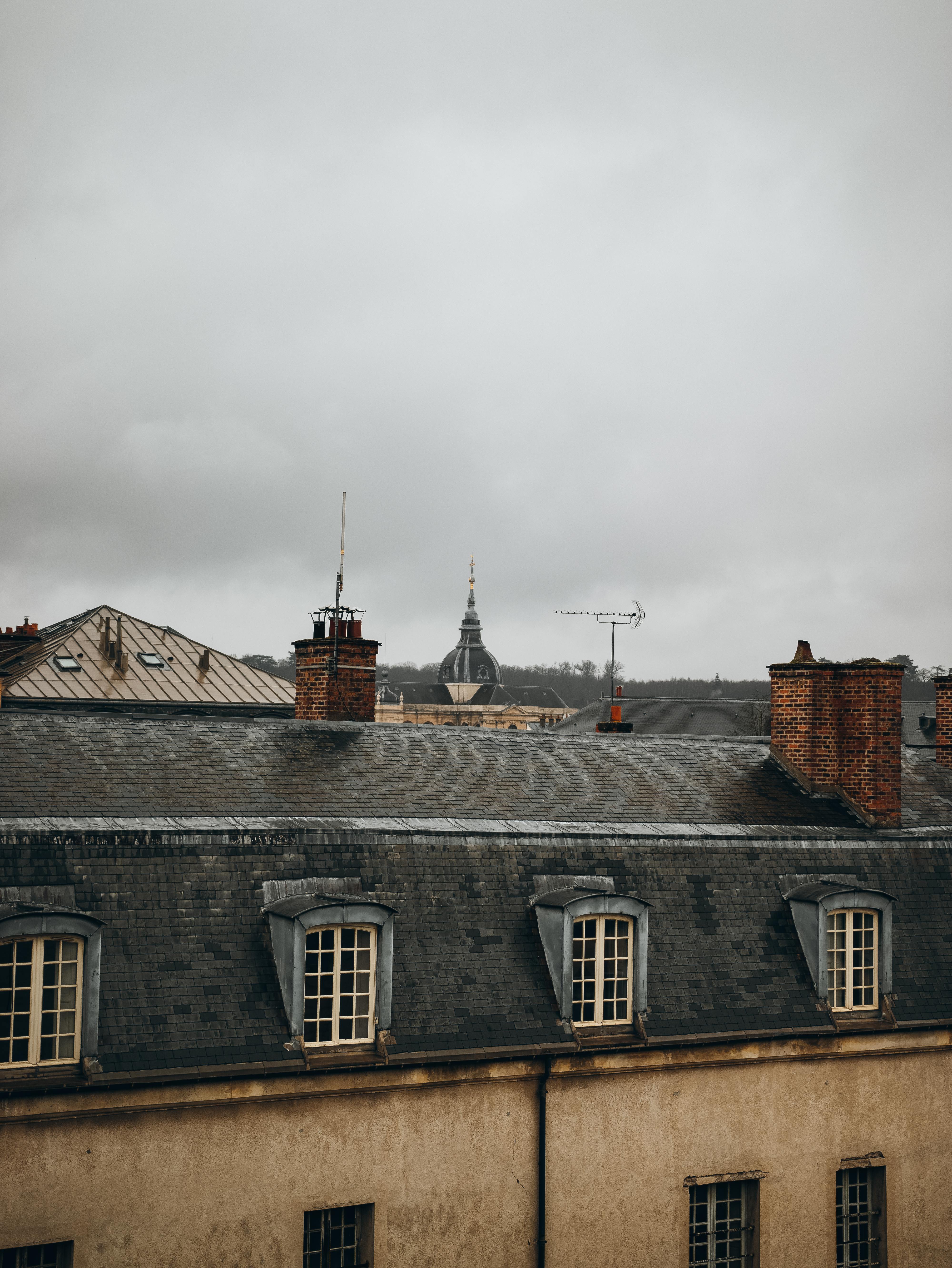 Rooftop of a Traditional House in Paris, France · Free Stock Photo