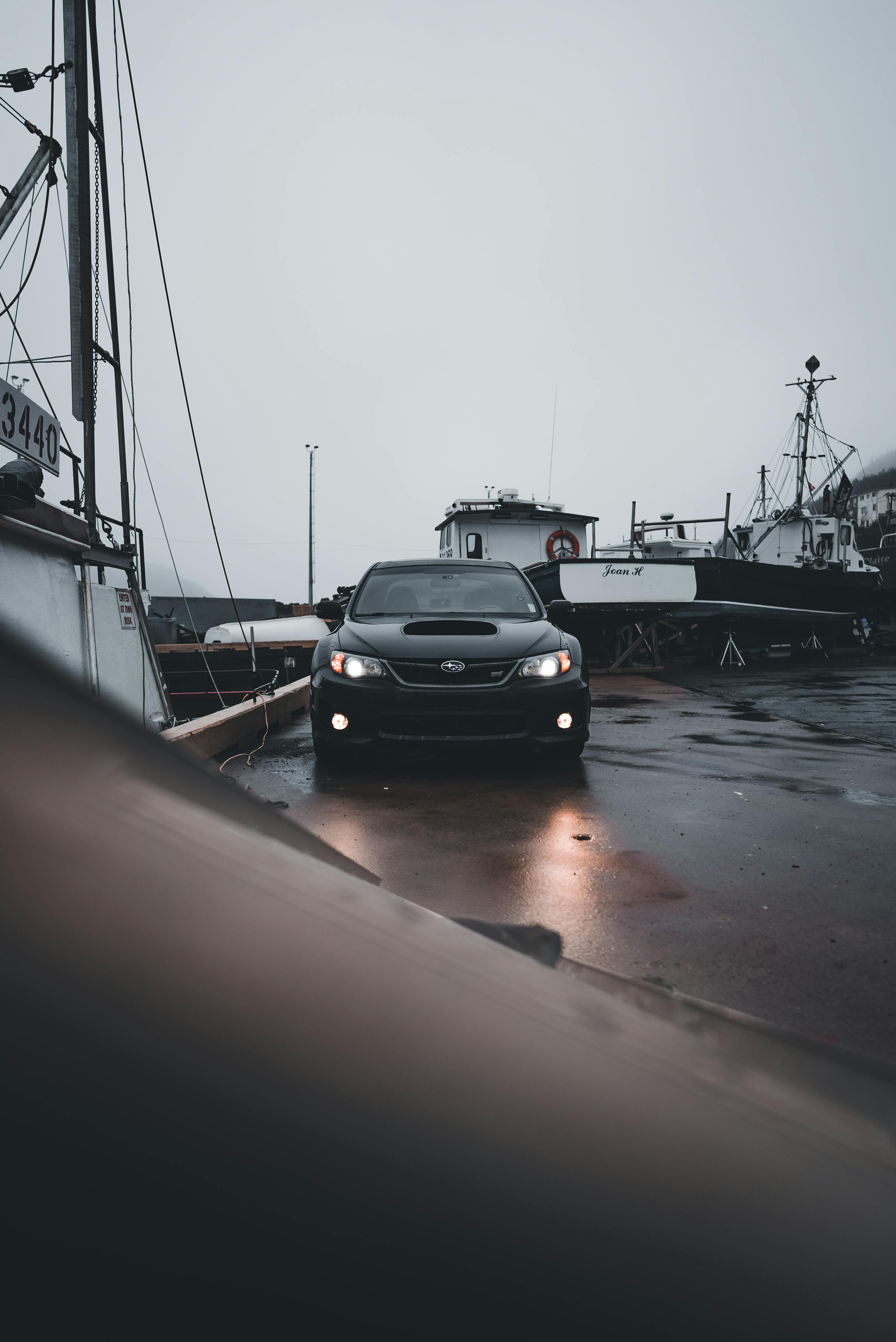 Car behind Window in Rain · Free Stock Photo