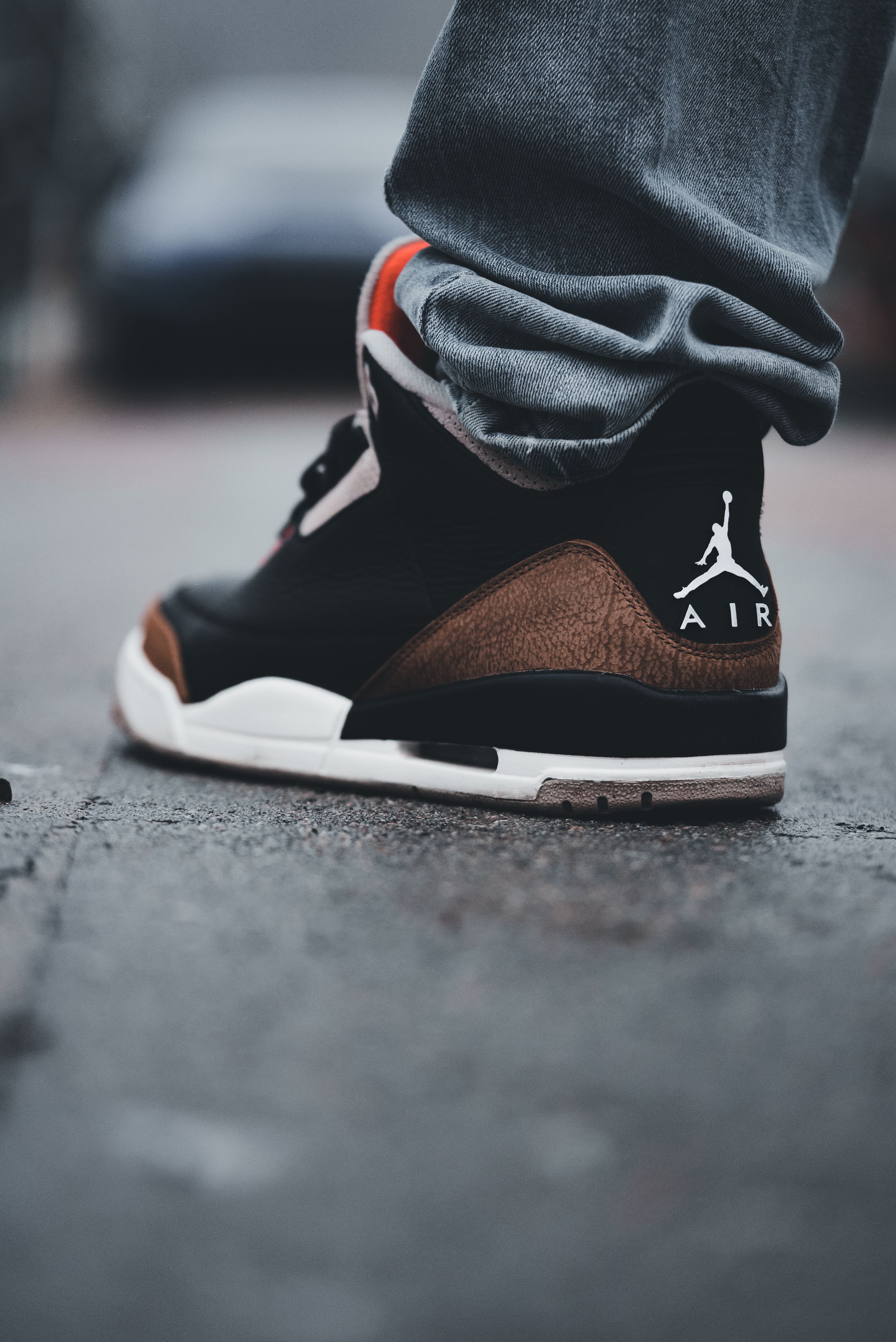 A Young Man Holding Air Jordan 1 Retro High UNC Patent Shoe · Free ...