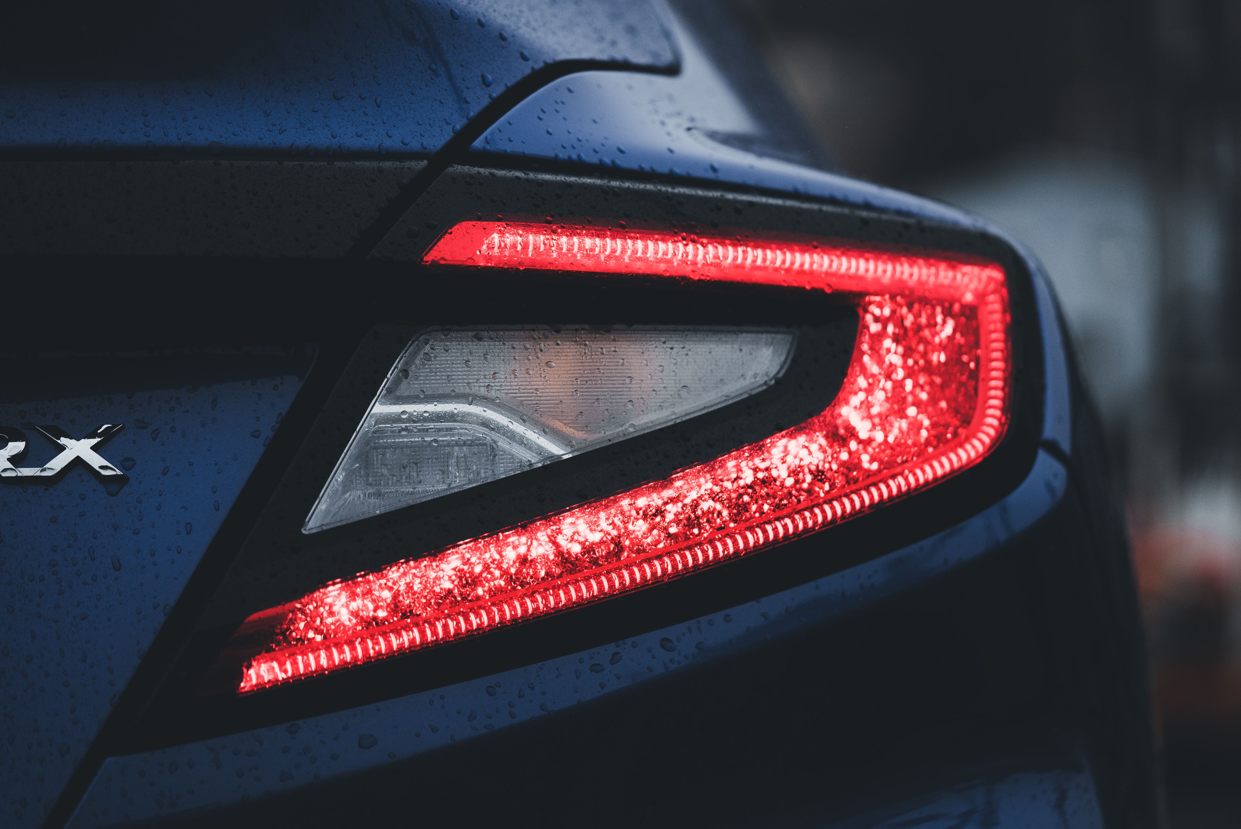 Close-up of the Tail Light in a Blue Subaru WRX · Free Stock Photo