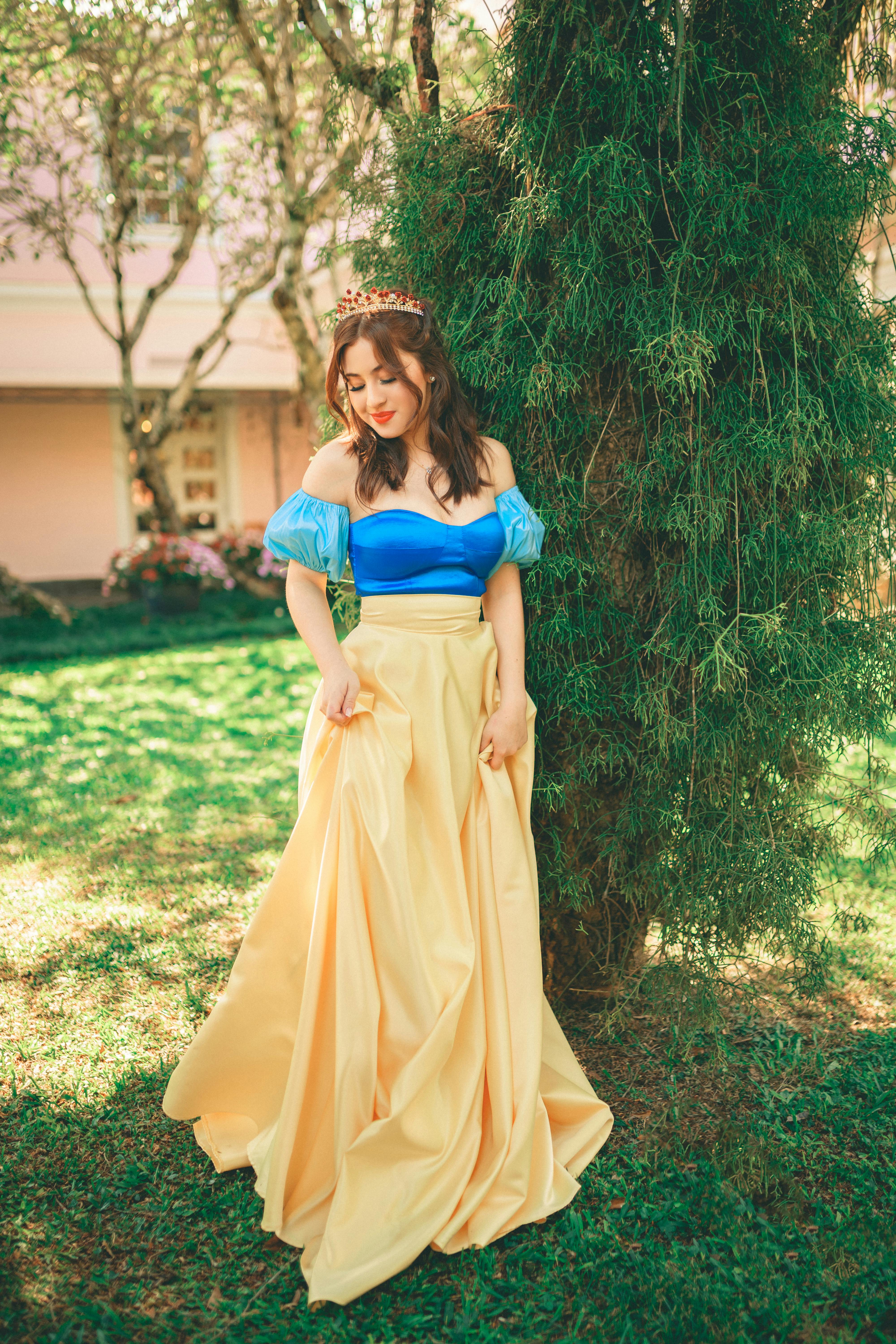 Woman in Princess Costume Posing by Tree · Free Stock Photo