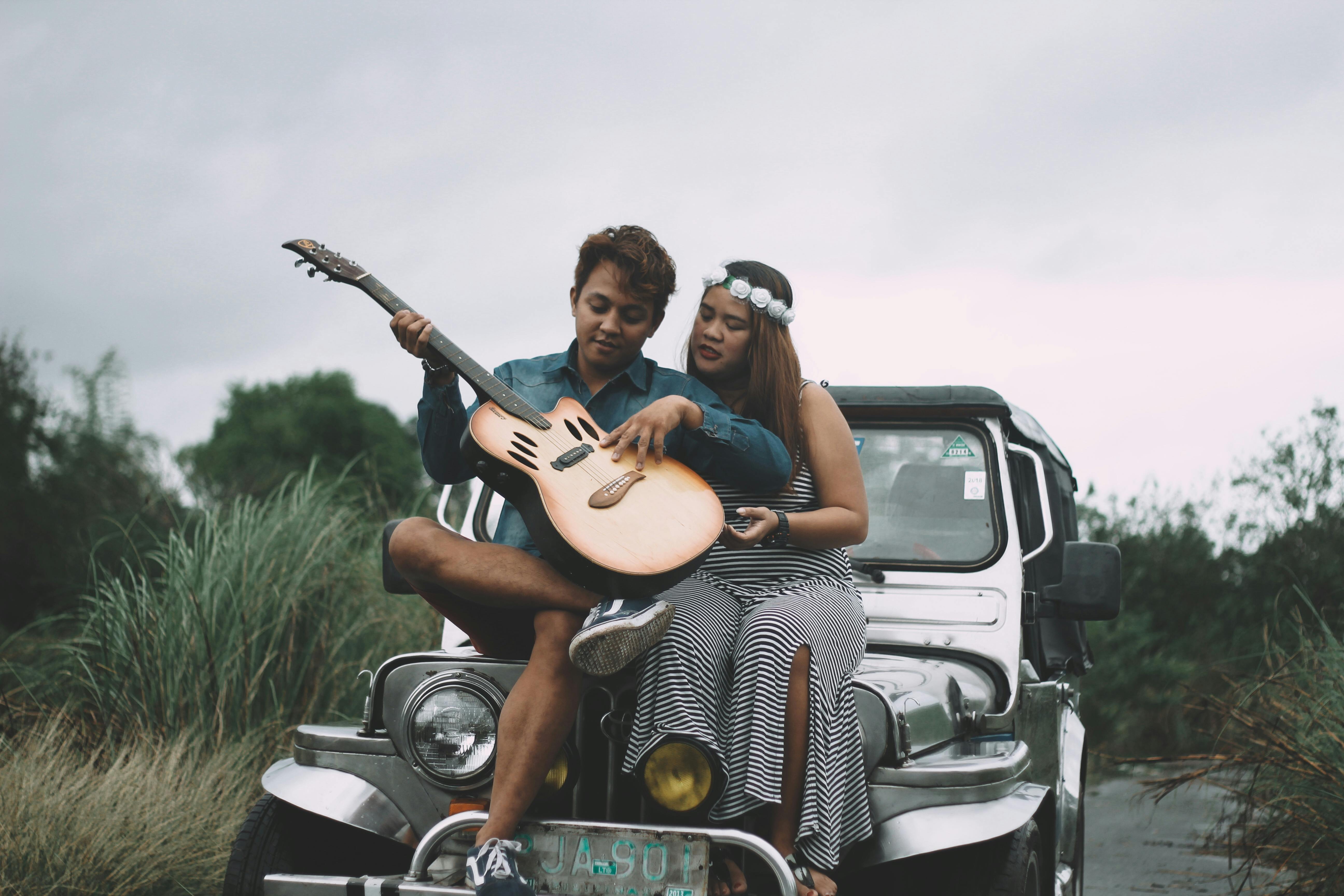 People Sitting On Jeep · Free Stock Photo