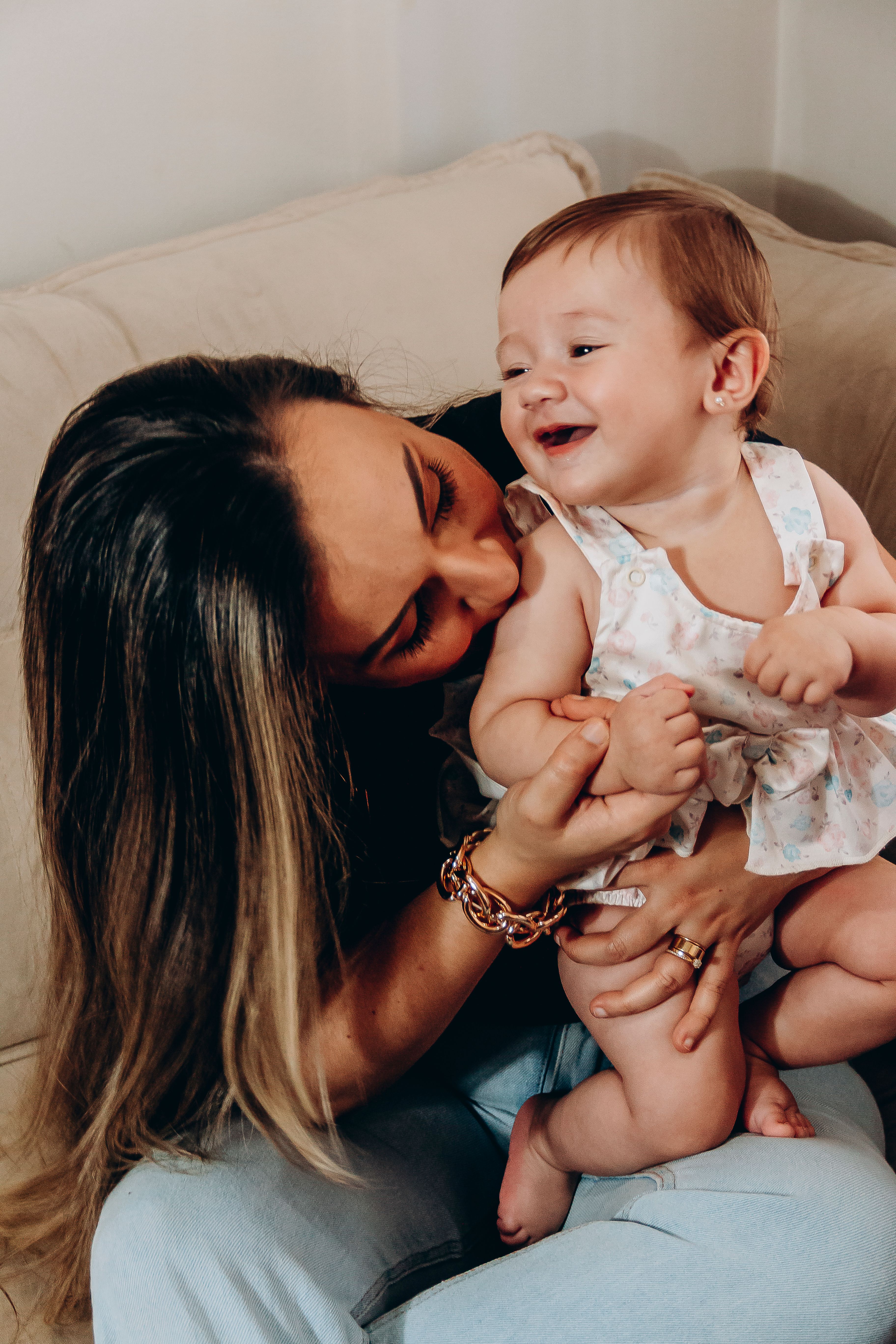 A Mother Caring for Her Baby · Free Stock Photo