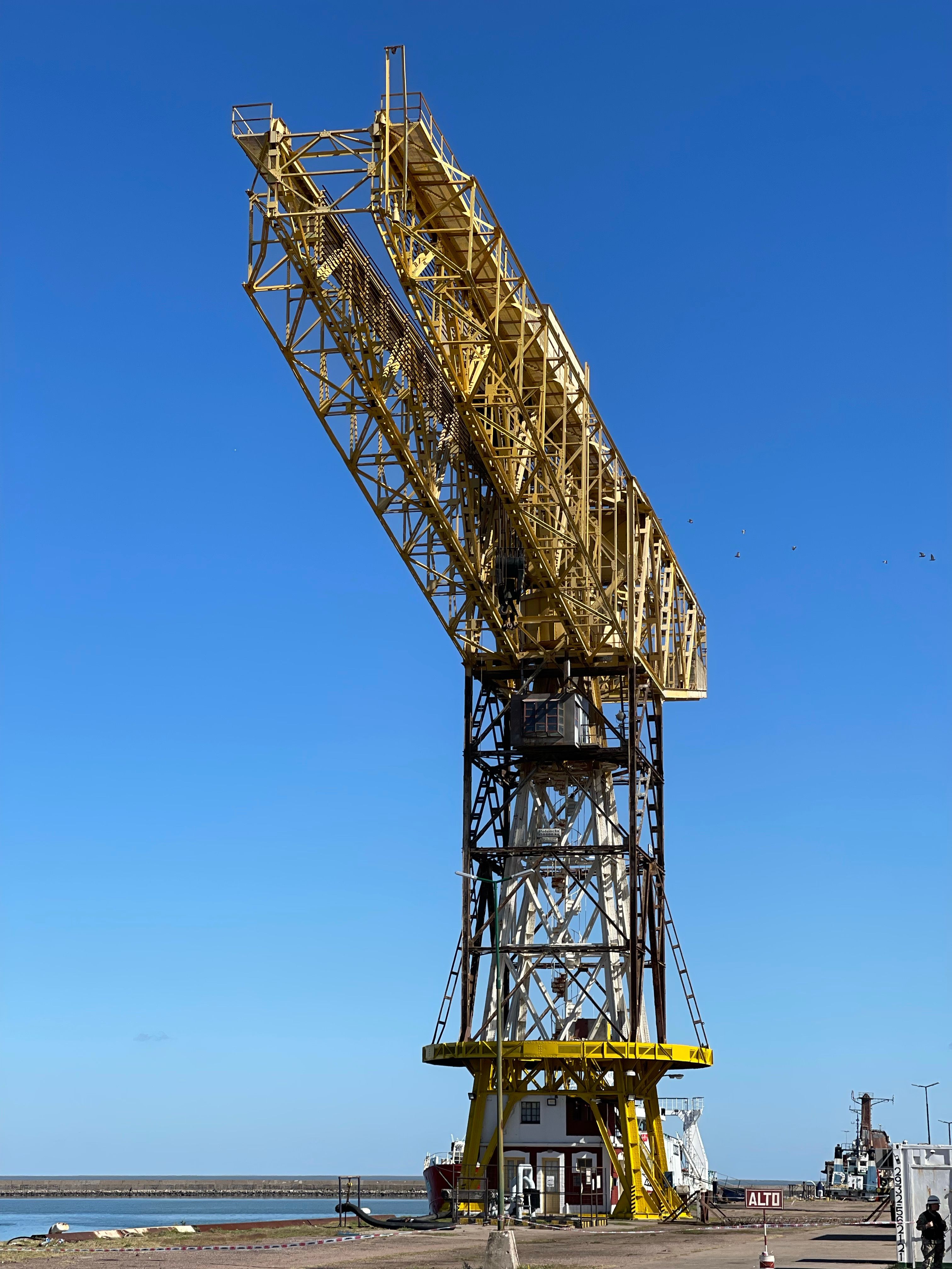 Blue shipboard crane in industrial port · Free Stock Photo