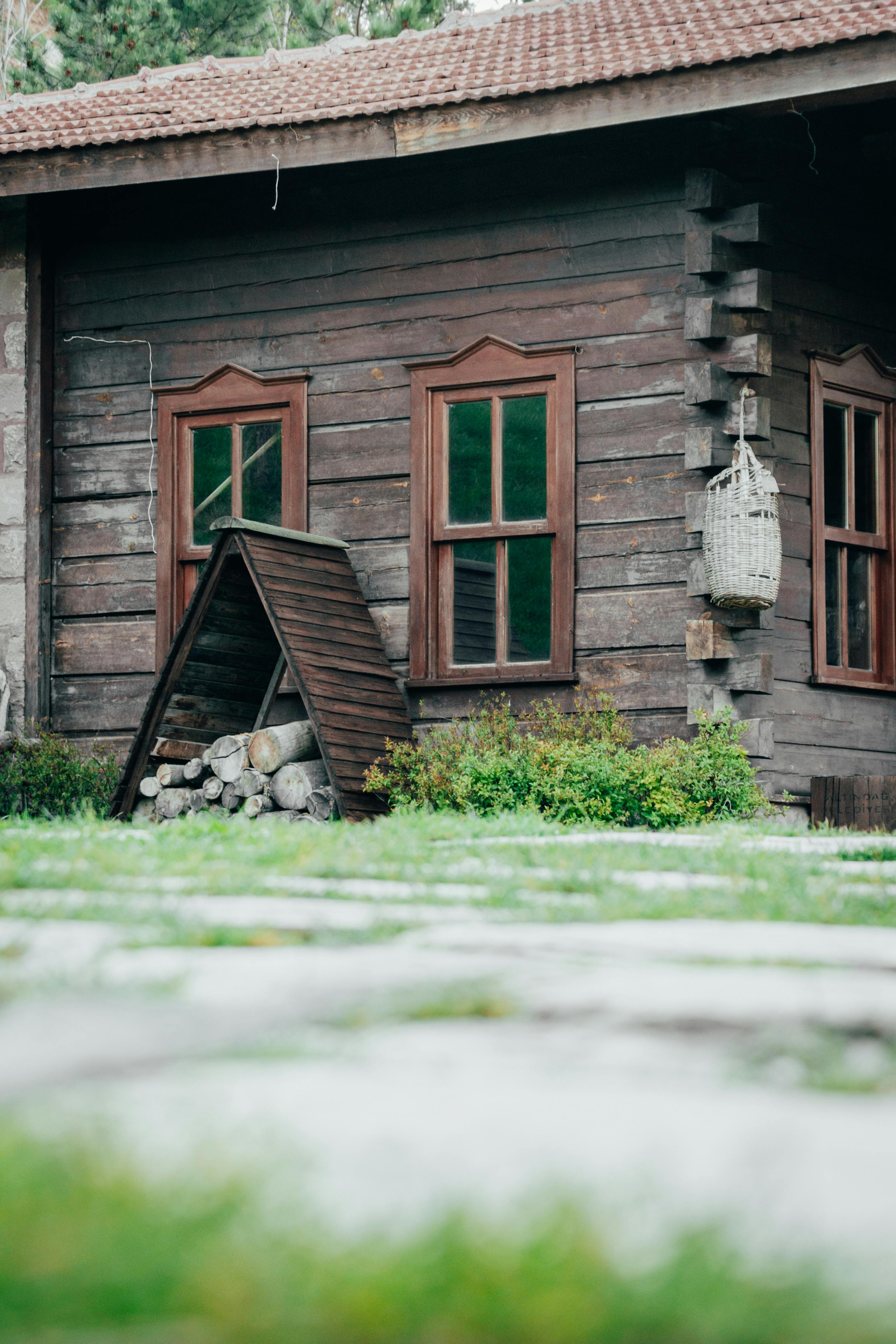 Brown Wooden Cottage at the Field during Day · Free Stock Photo