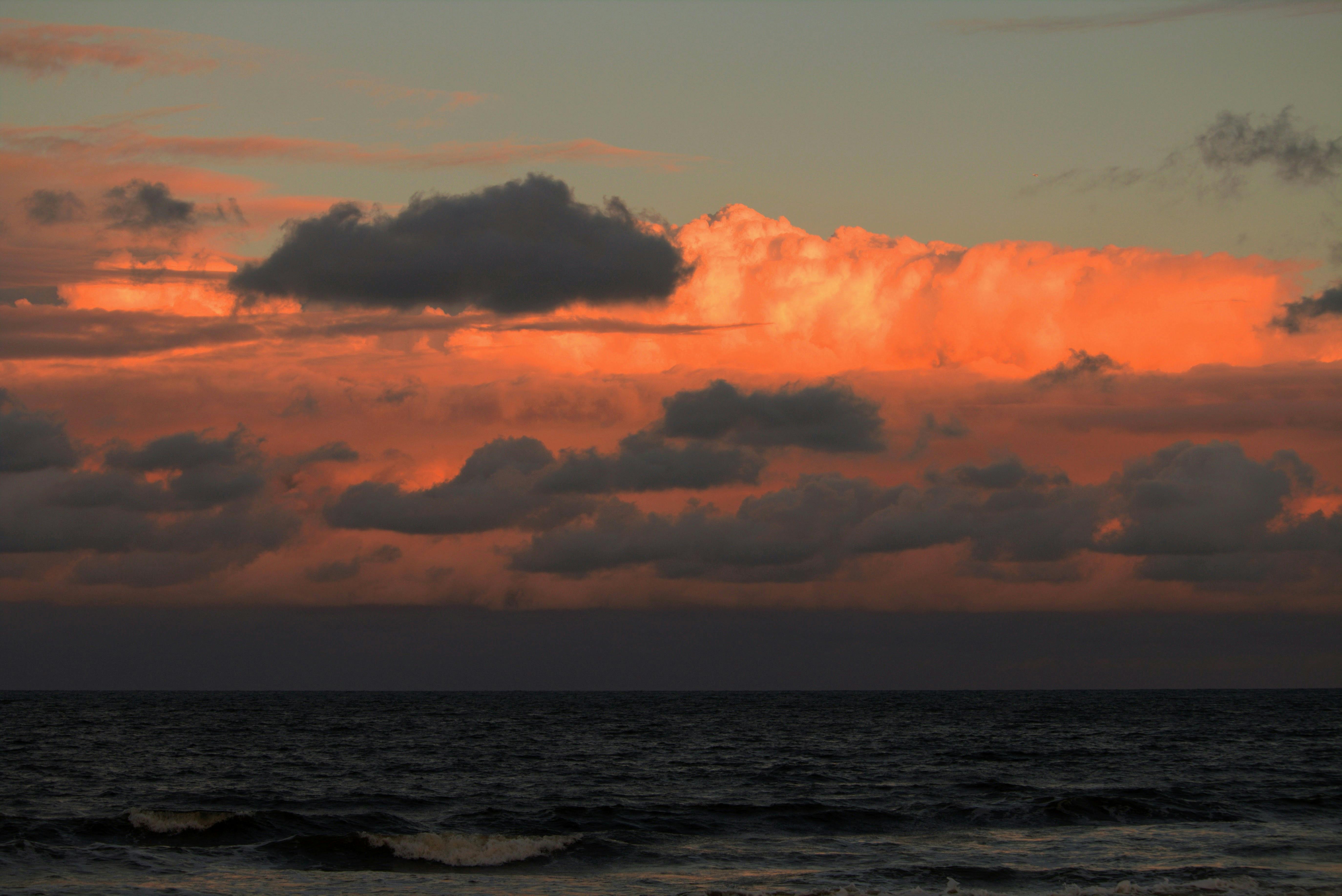 Clouds on Sky over Sea Shore at Sunset · Free Stock Photo