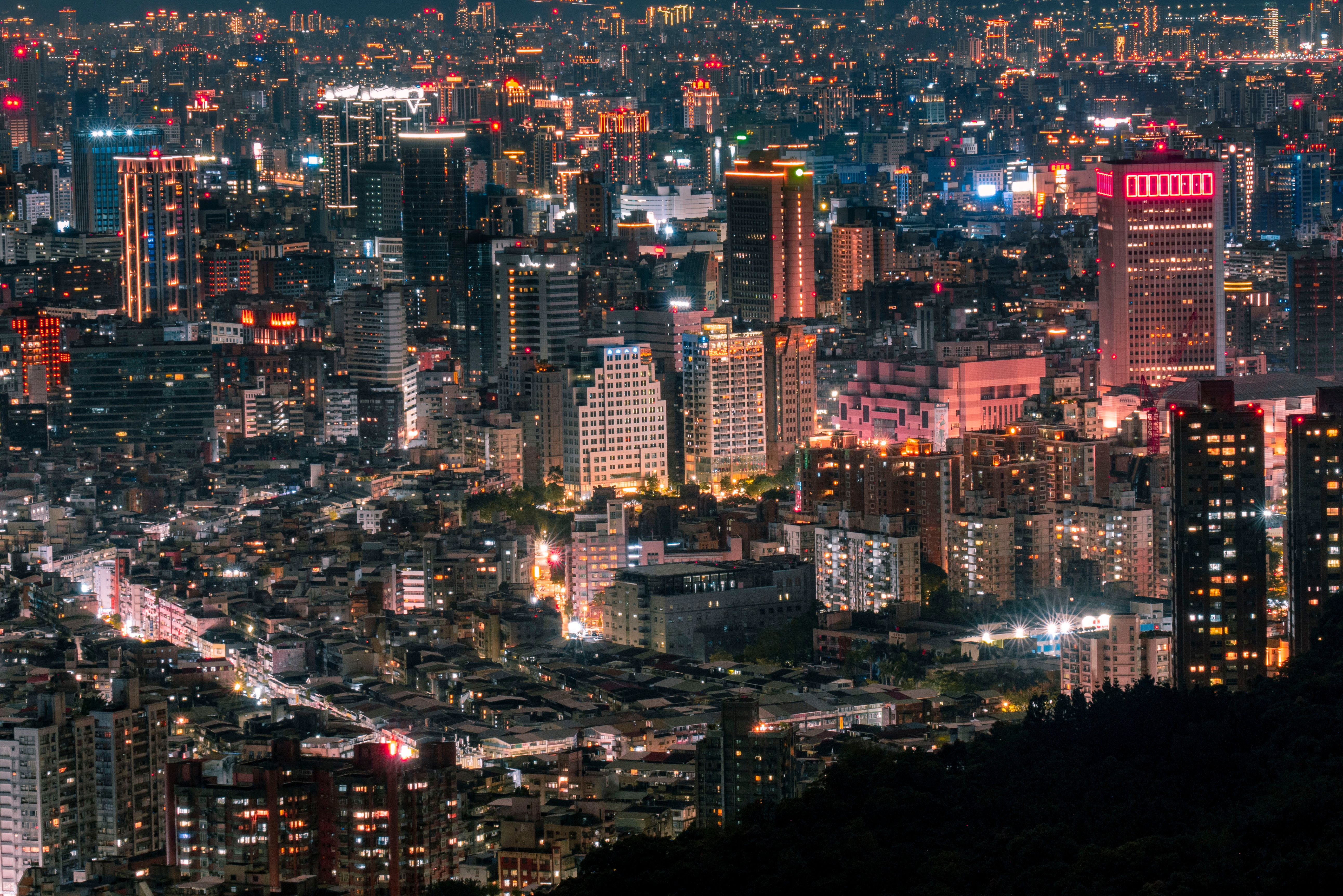 Lights on Buildings in City at Night · Free Stock Photo