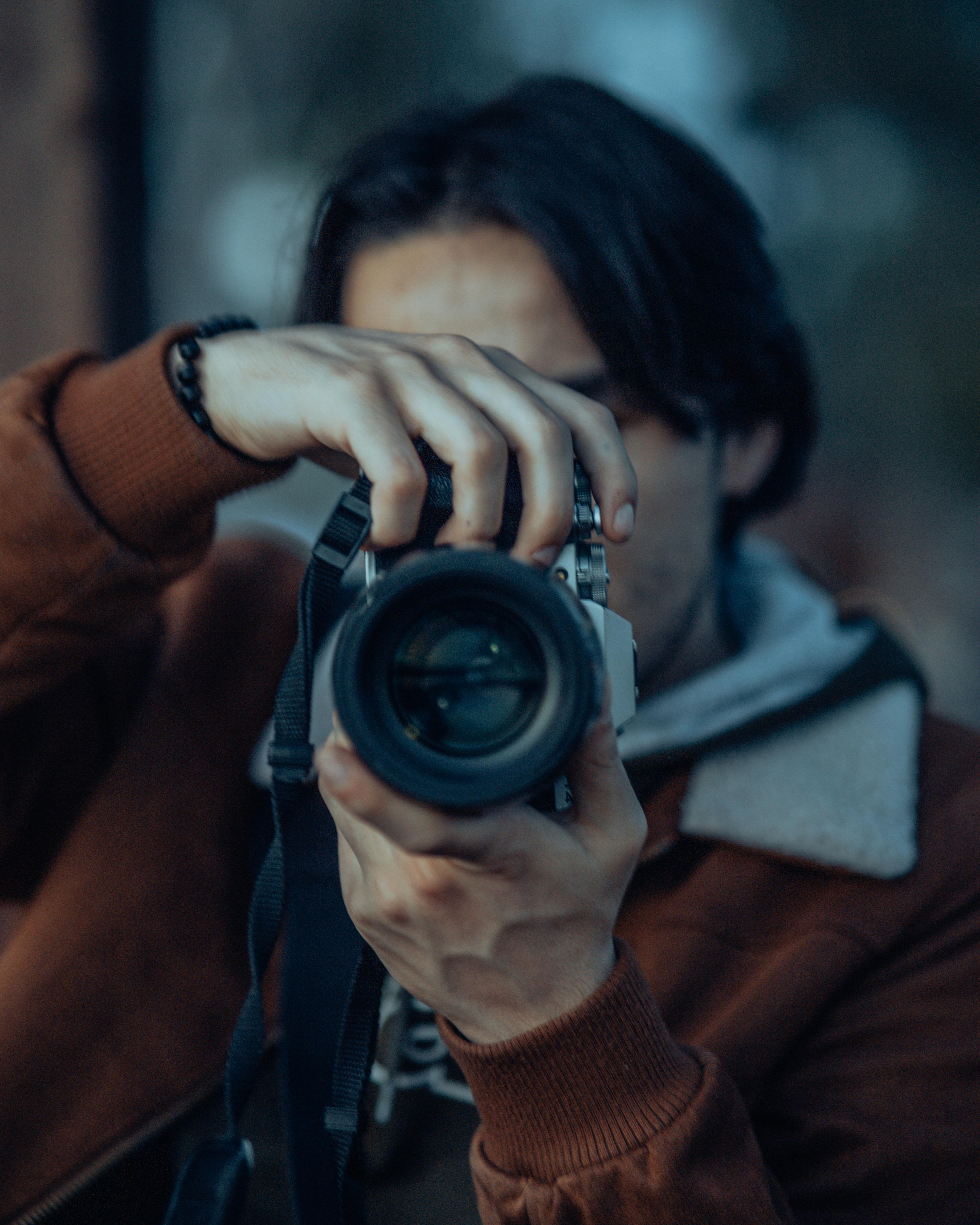 Woman Using Slr Camera · Free Stock Photo