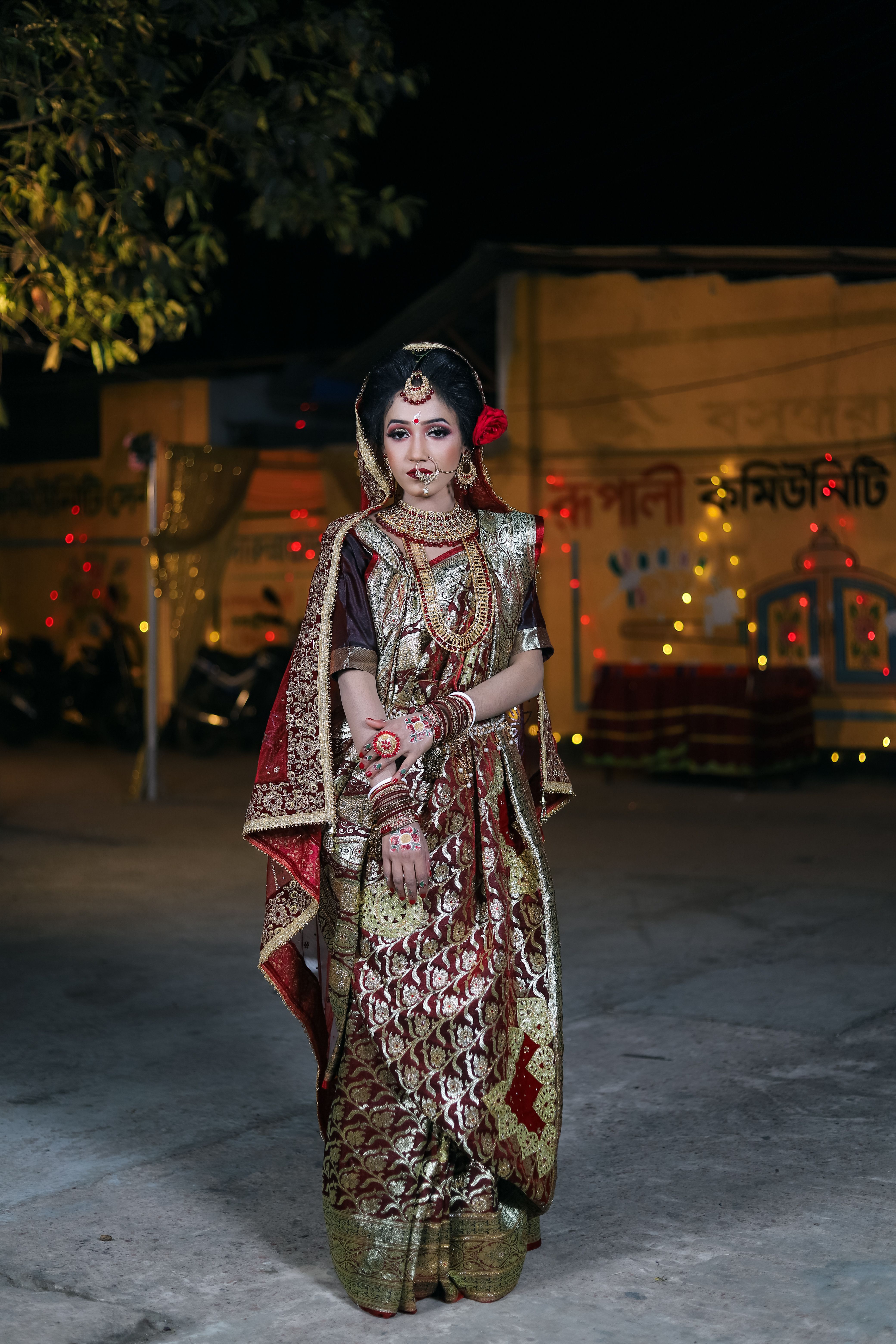 Praying Bride in Traditional Indian Wedding Attire · Free Stock Photo