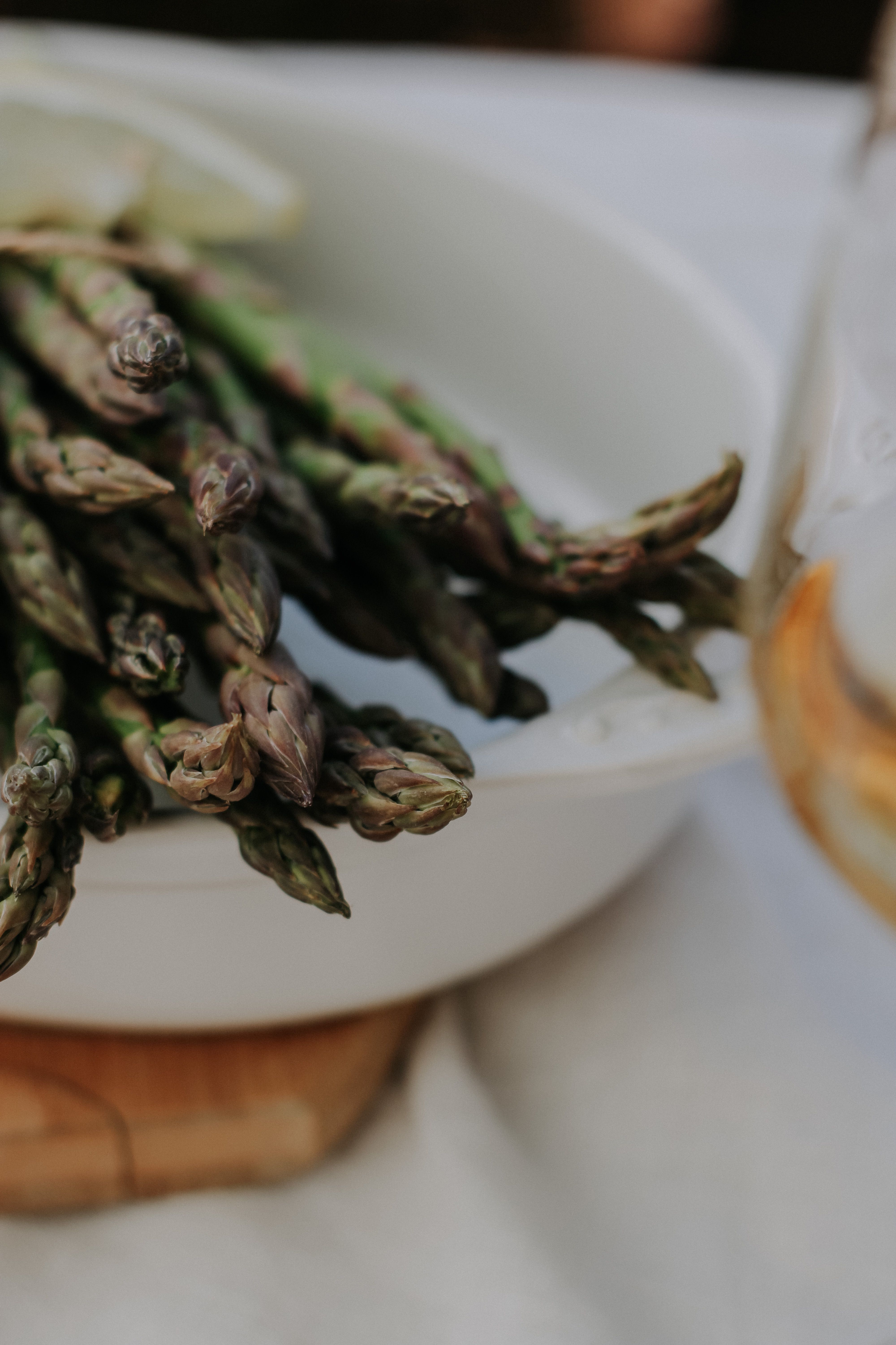Asparagus Bundle in Ceramic Plate · Free Stock Photo