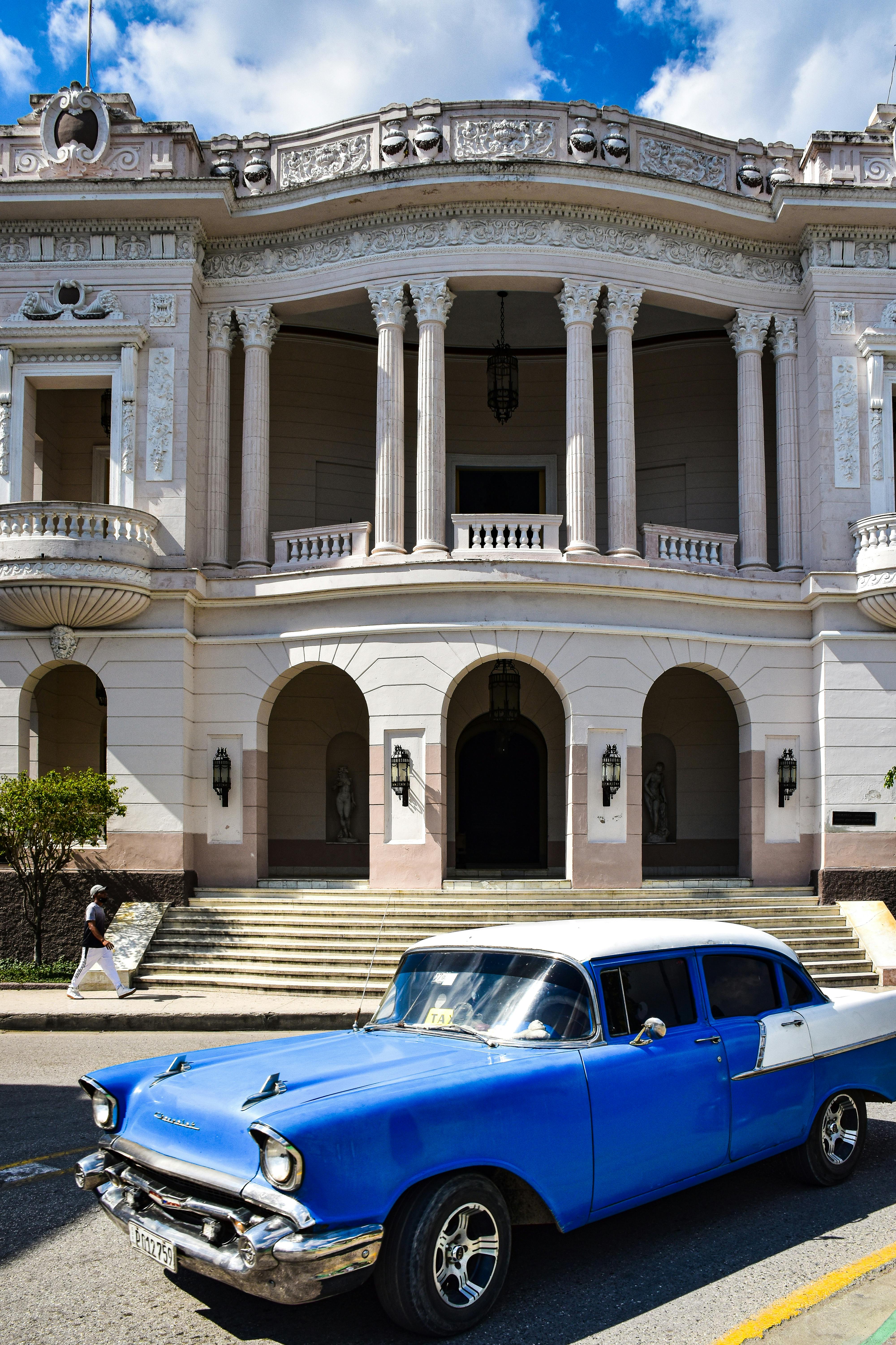 A Cadillac in Front of the Ruben Martinez Villena Library, Sancti ...