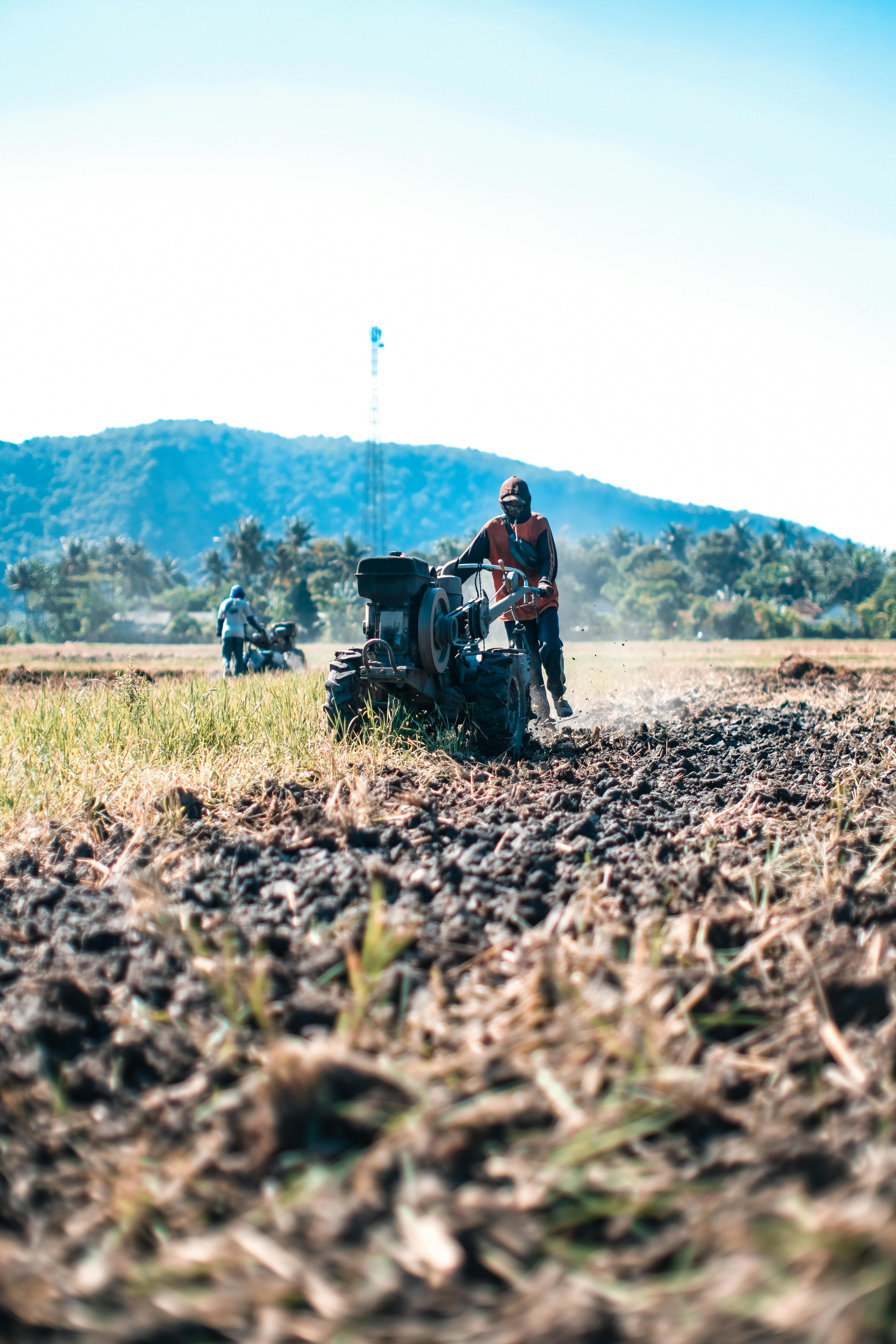 Man Working on the Field · Free Stock Photo