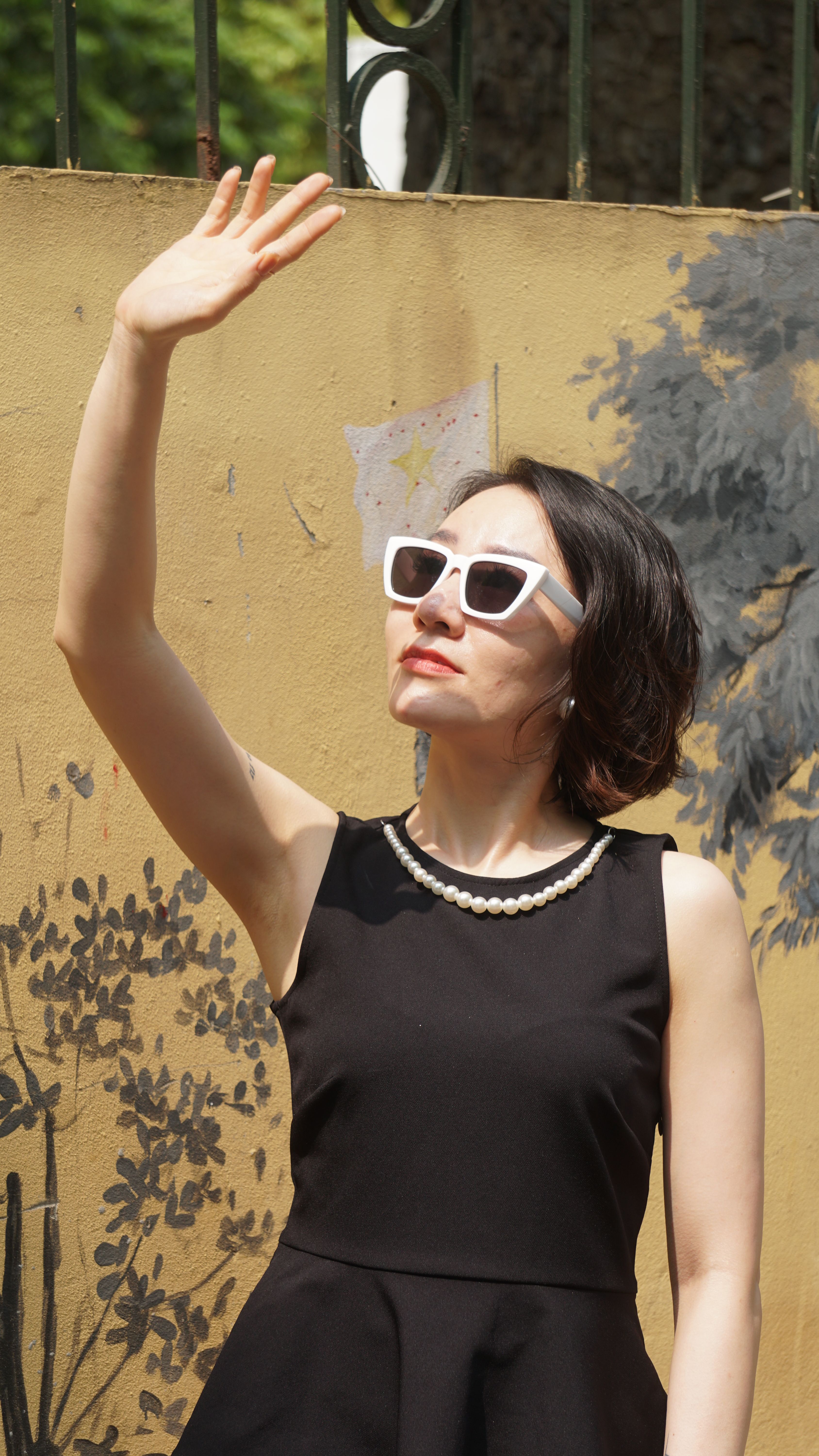 Woman Raising her Arm · Free Stock Photo