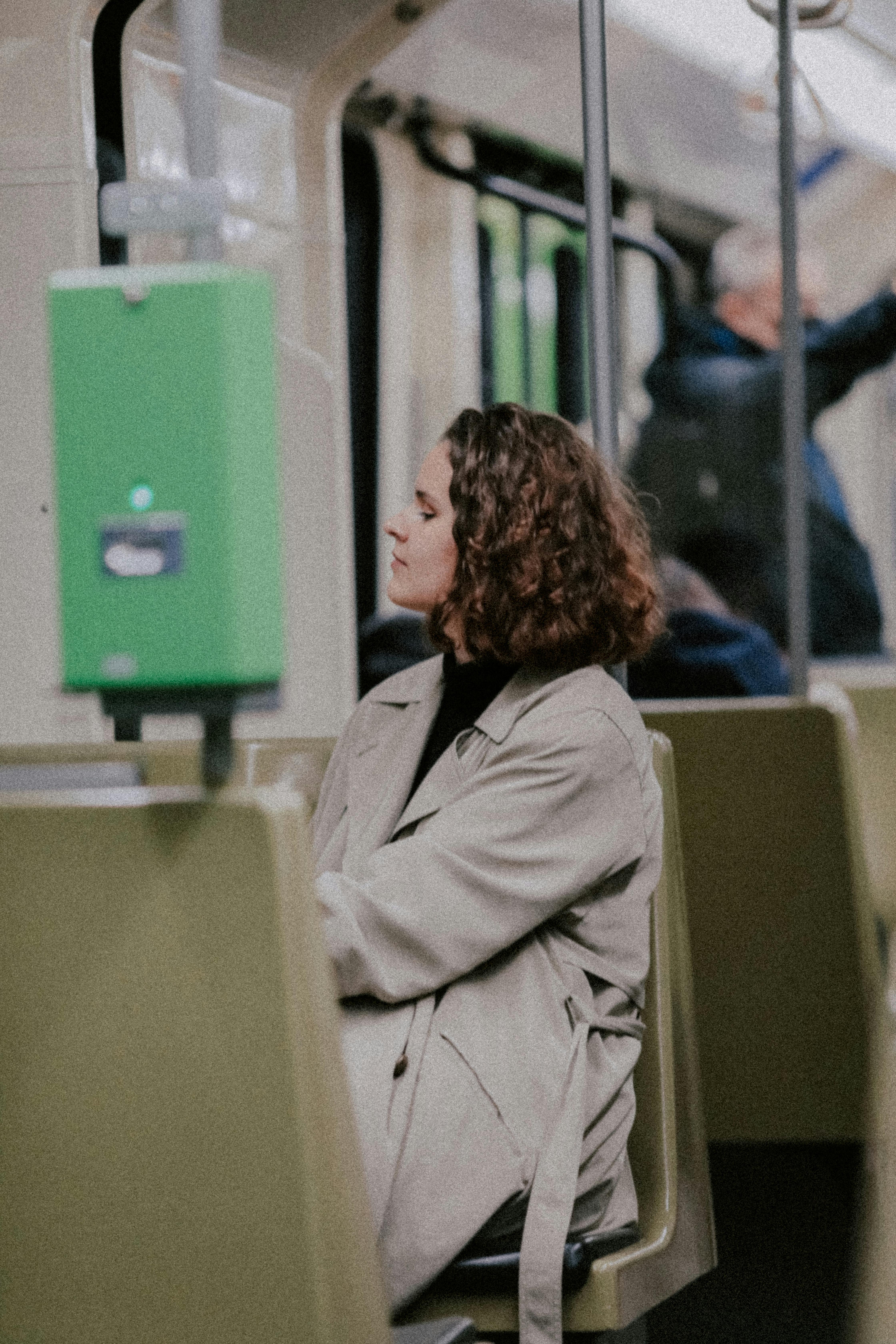 Photo of a Woman Standing Inside Bus · Free Stock Photo