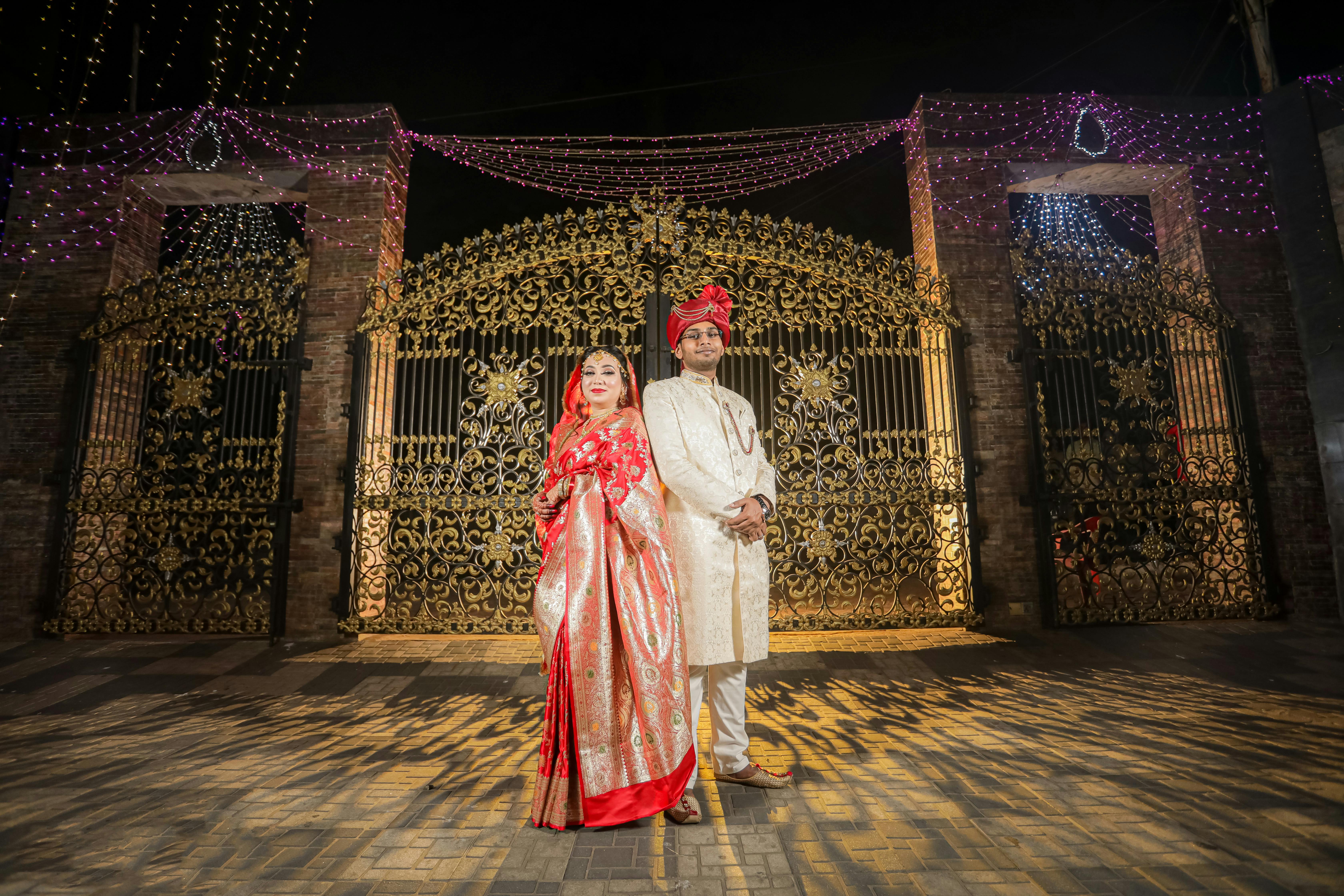 A Traditional Wedding Couple in a Temple · Free Stock Photo
