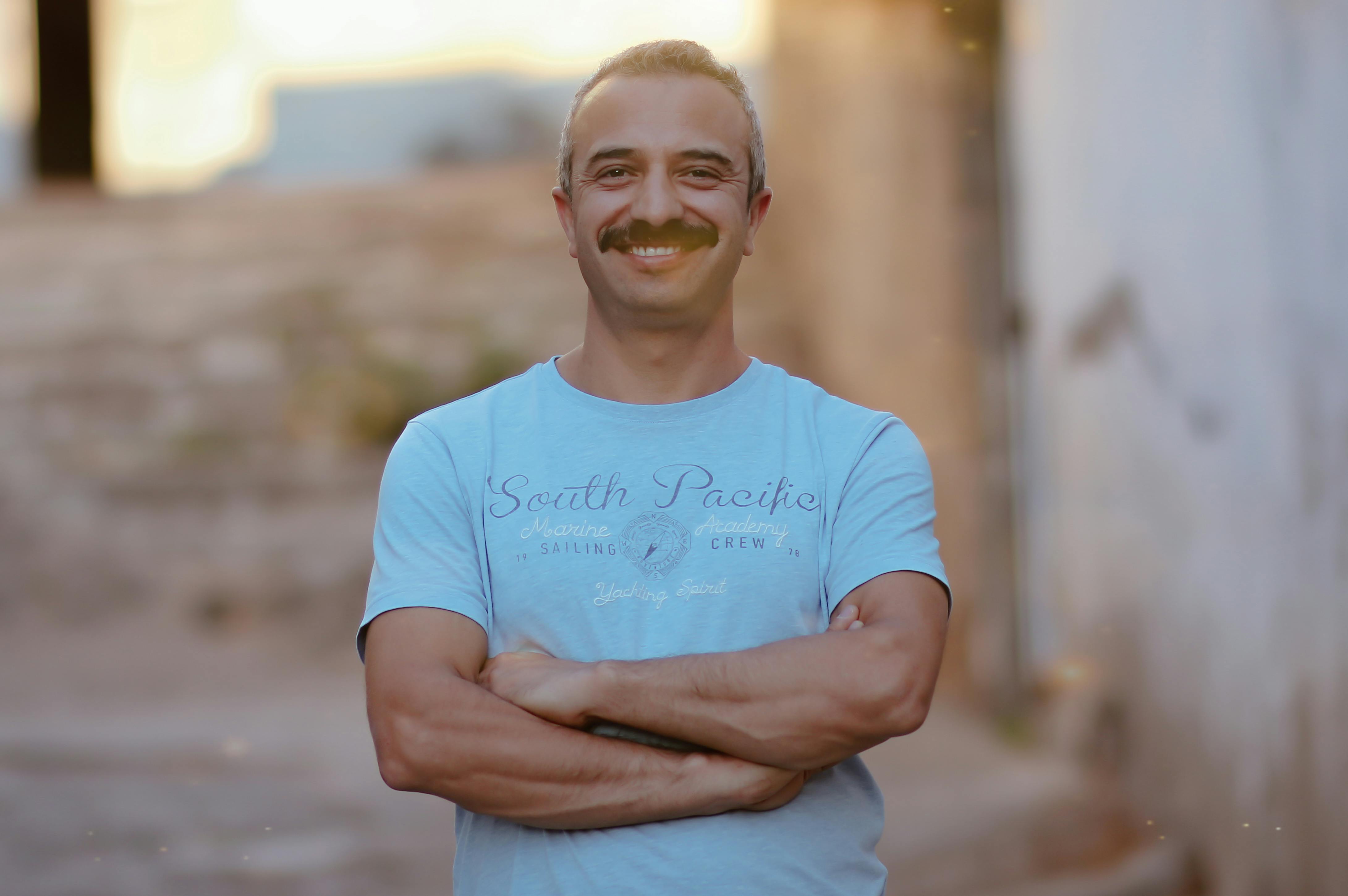 A Man with Moustache on a Street · Free Stock Photo